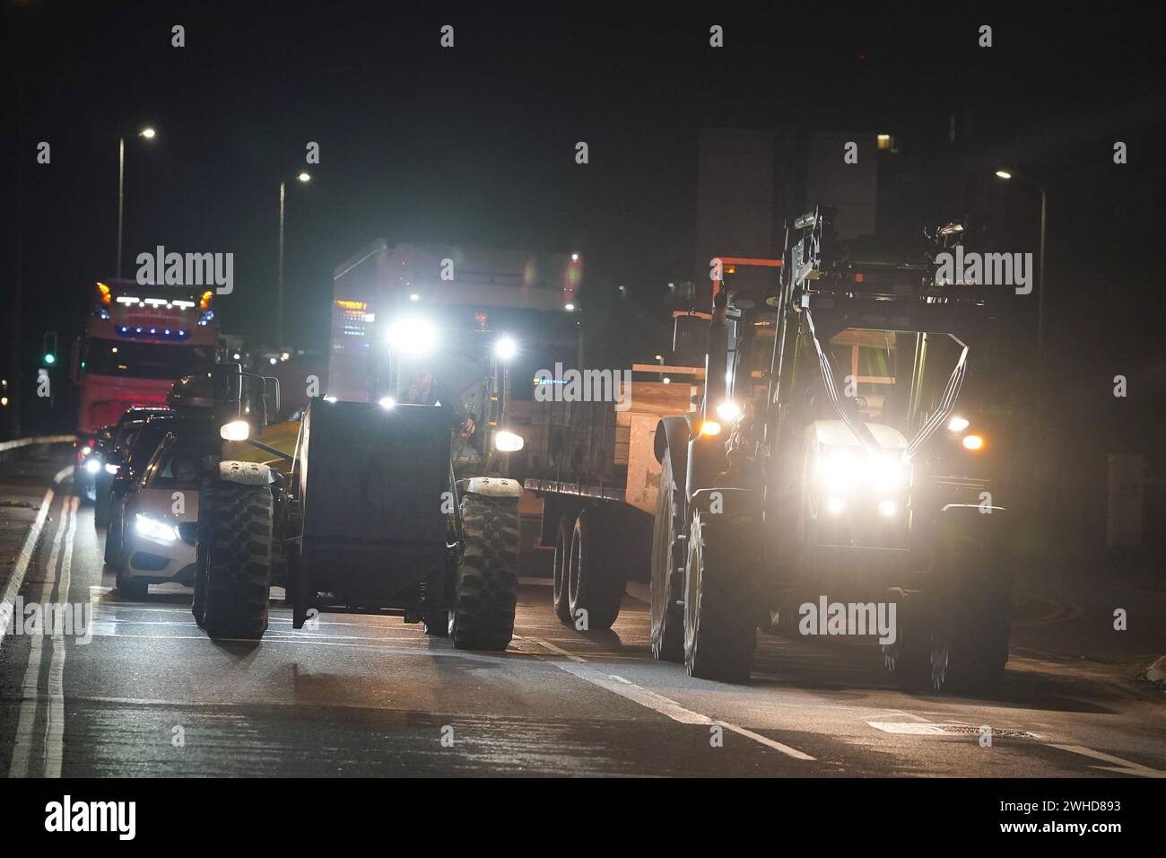 Farmers using their vehicles to cause disruption and slow traffic ...