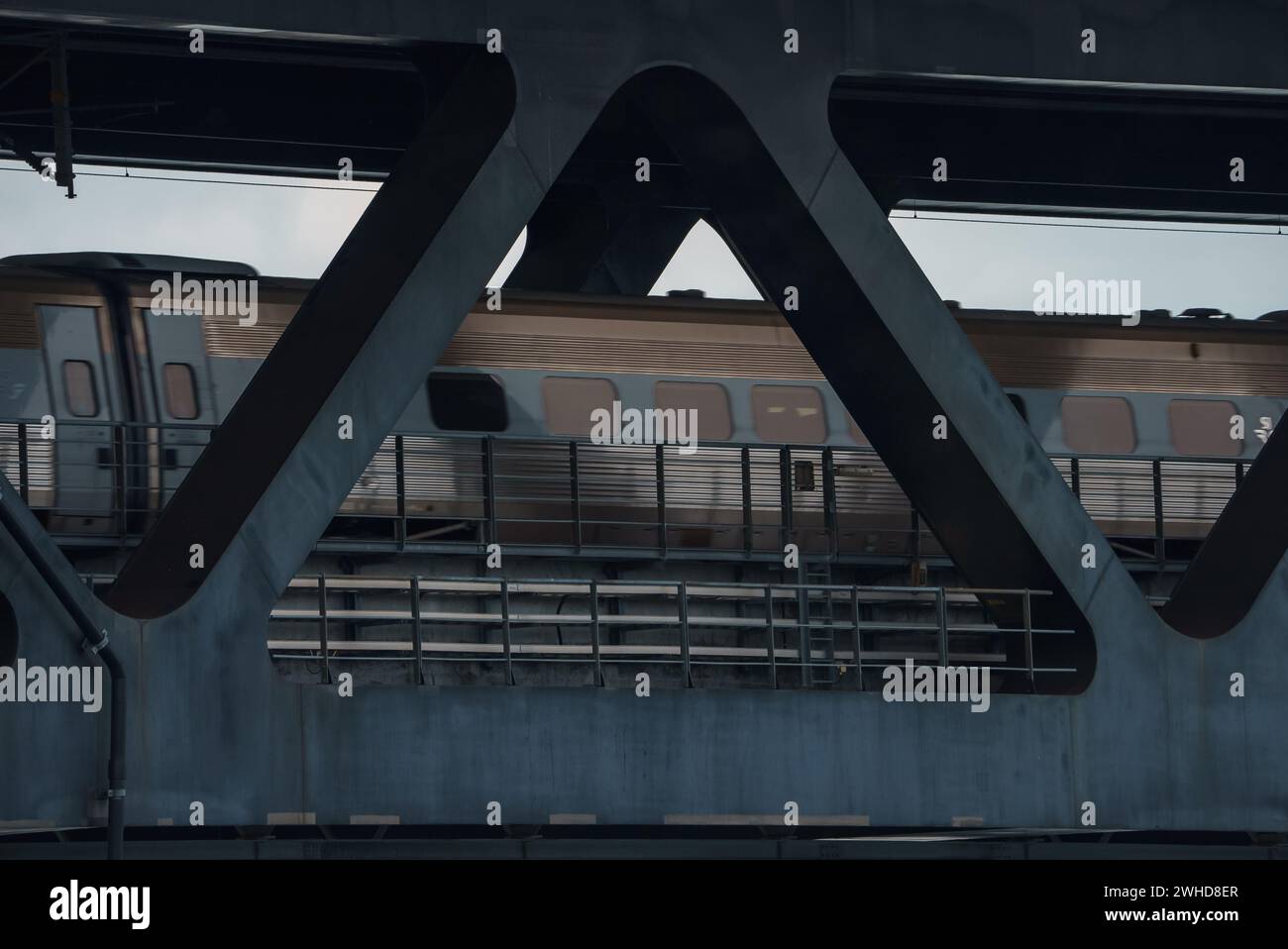 Modern Train crossing the Oresund Bridge's Metal Truss, Denmark to ...
