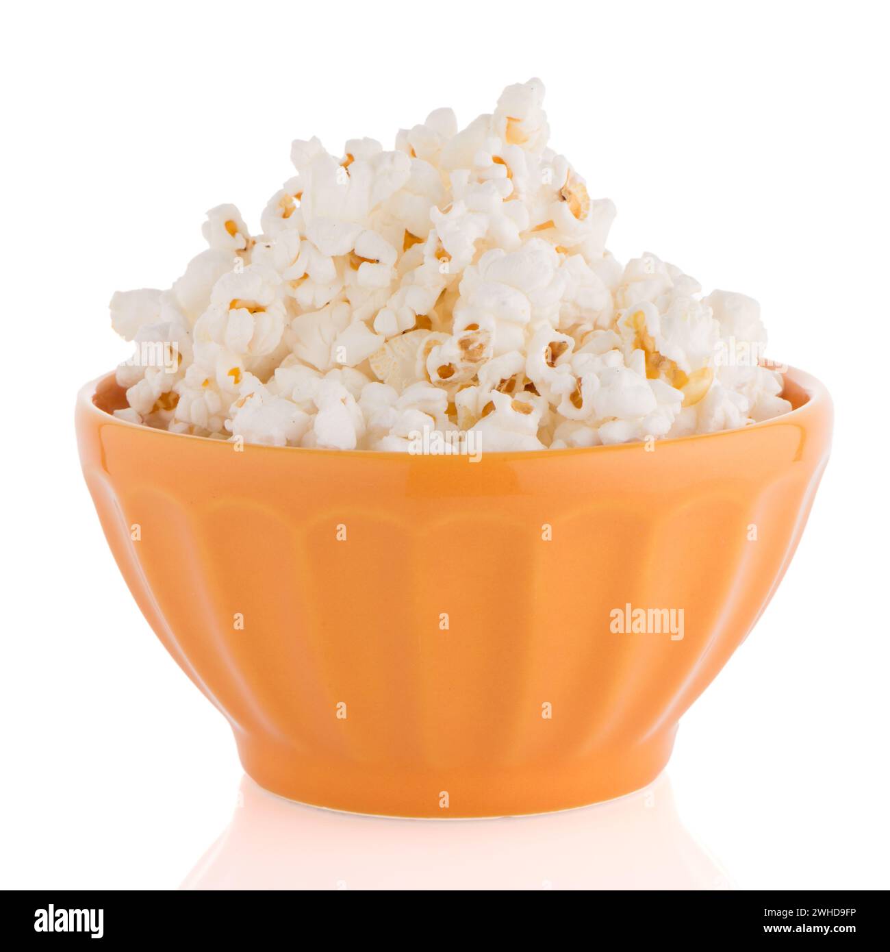 Popcorn in a orange bowl Stock Photo - Alamy
