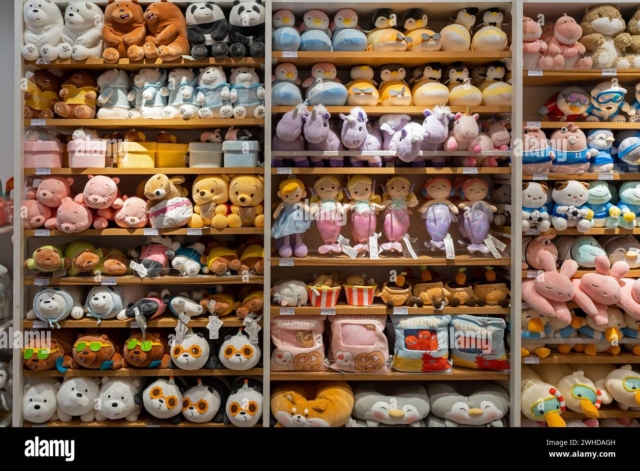 Soft toys at sale on shelves in Miniso store. Minsk, Belarus - february ...