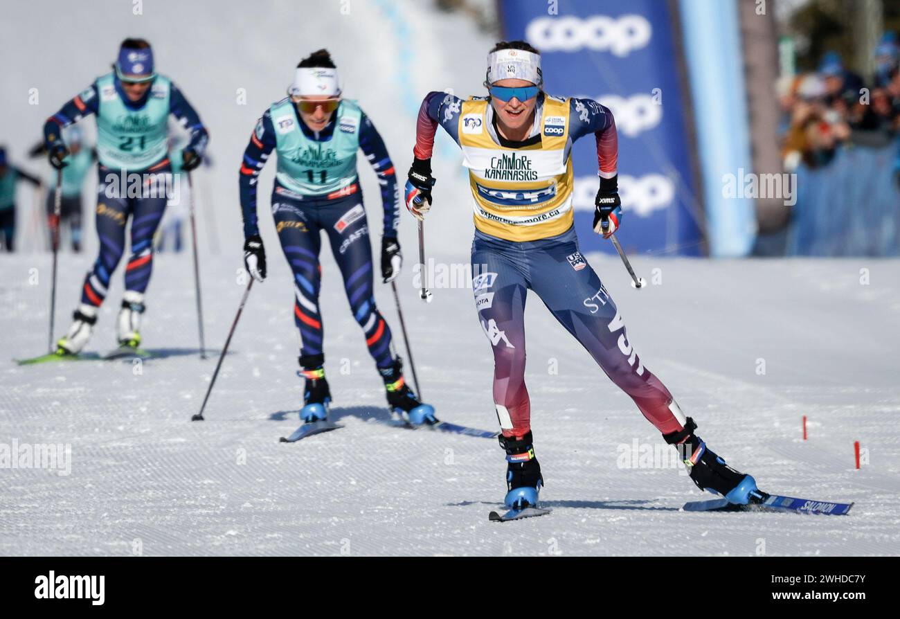 Jessie Diggins, right, of the United States, crosses the finish line to ...