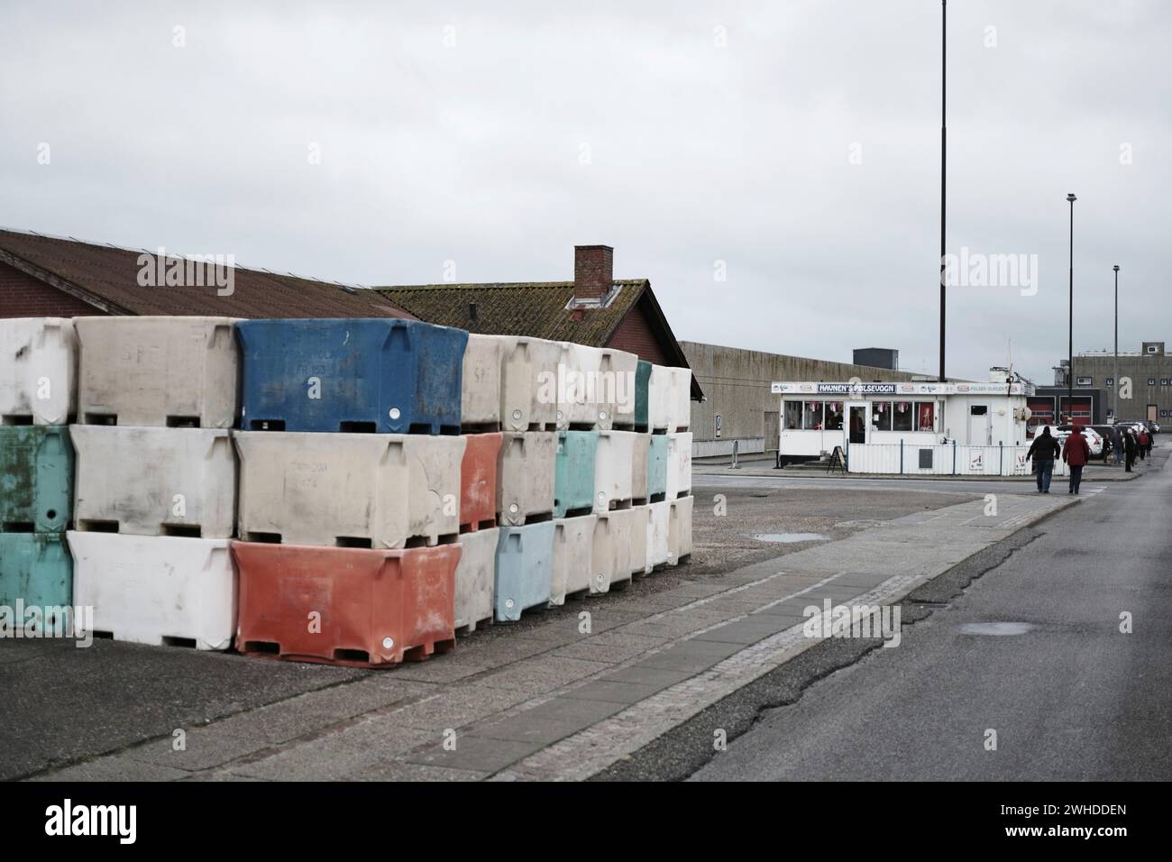 Stacked fish crates in Hvide Sande Stock Photo - Alamy