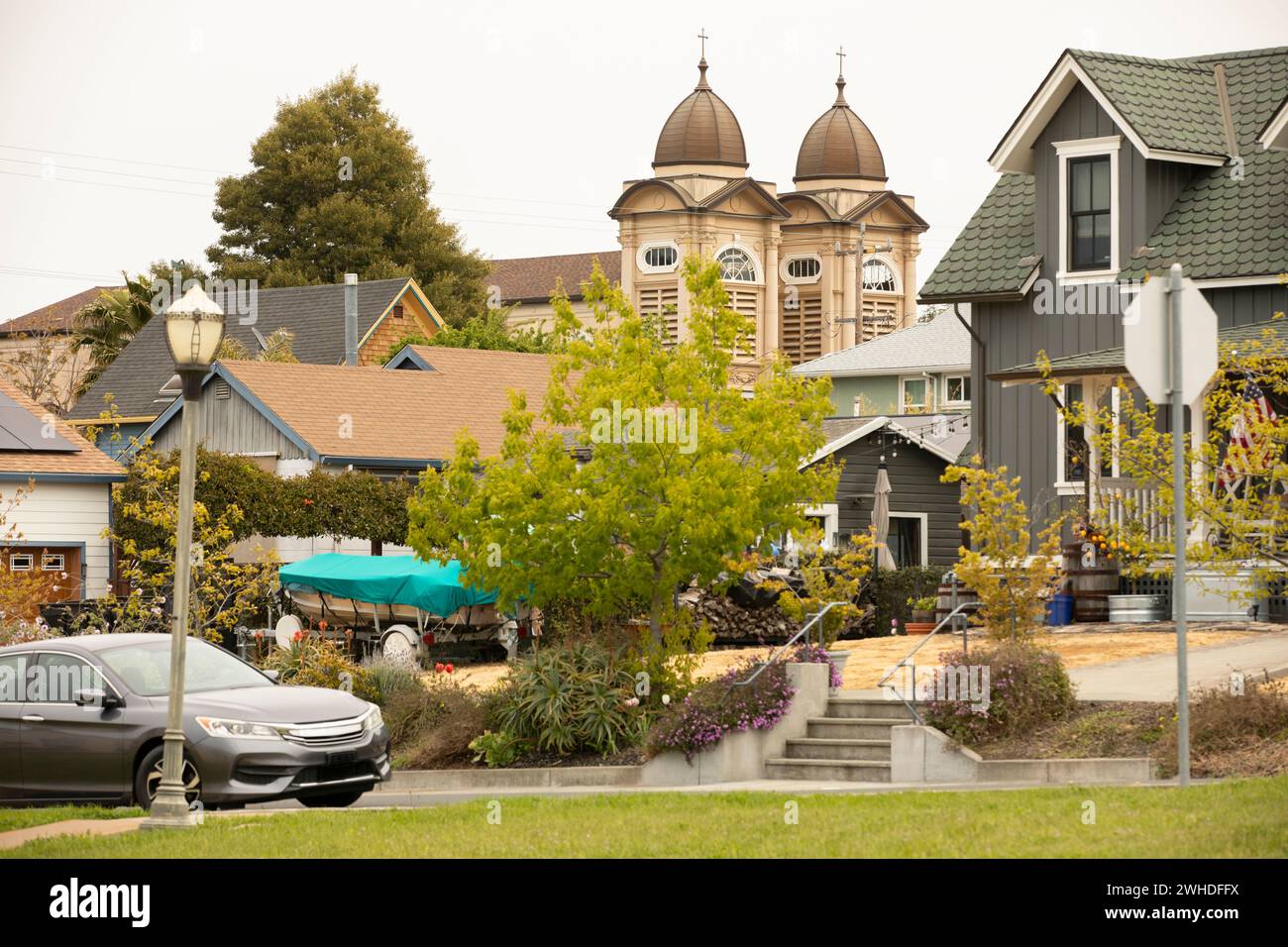Daytime view of a historic church and surrounding homes of downtown ...