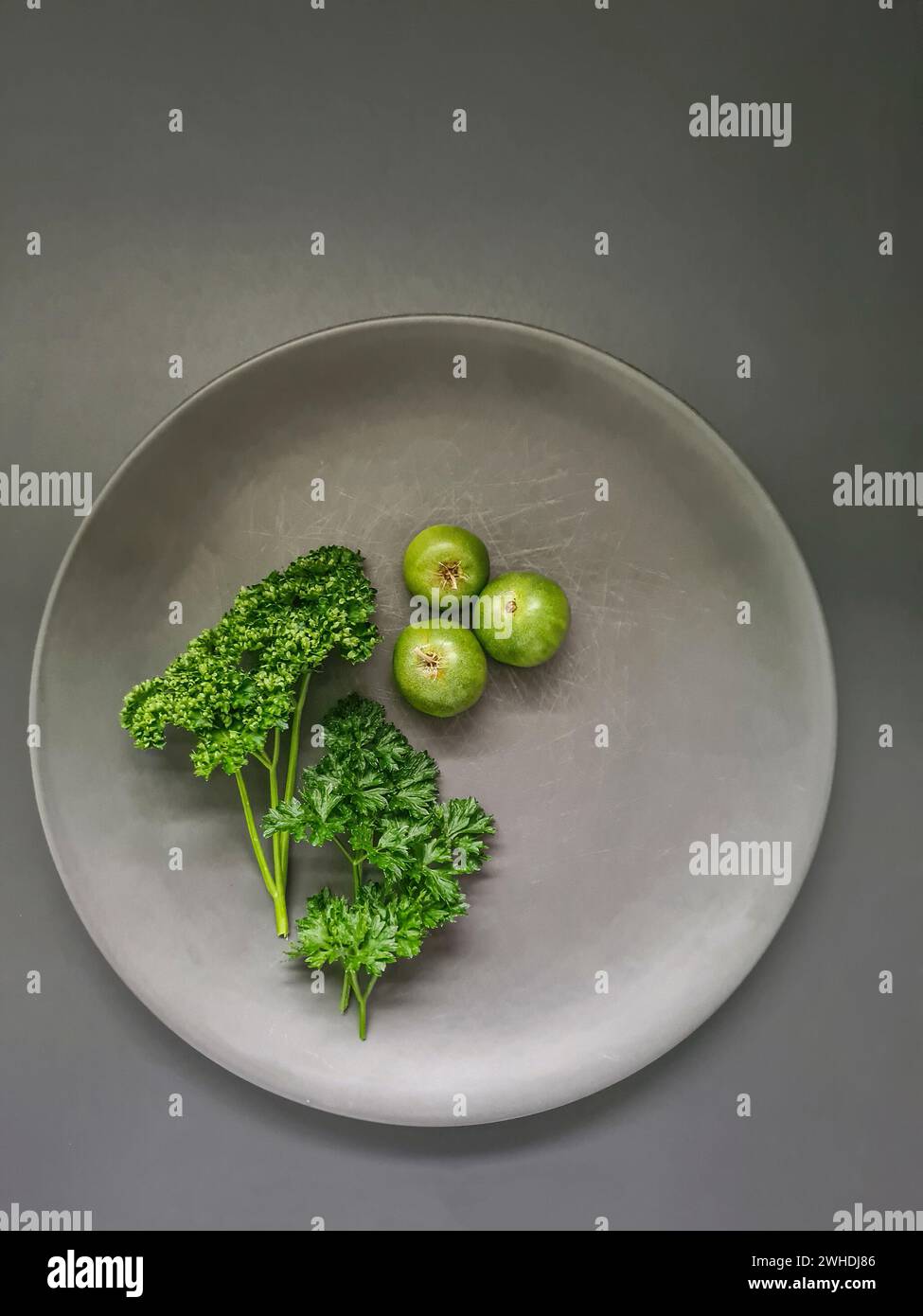 Curly parsley plate hi-res stock photography and images - Alamy