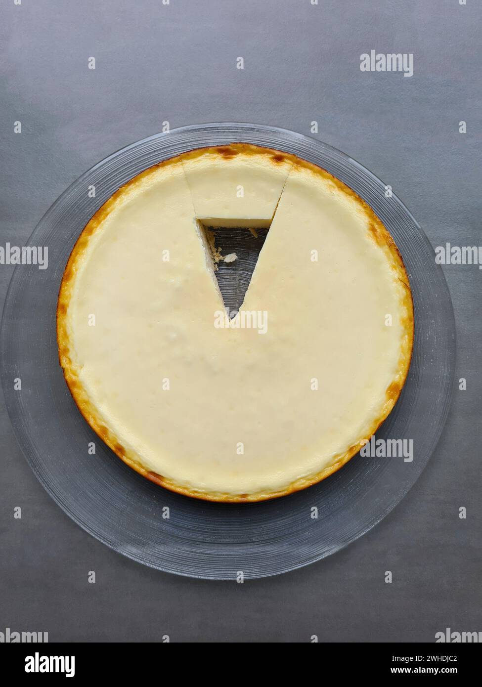 Moist cheesecake with a triangle in the cake hi-res stock photography ...