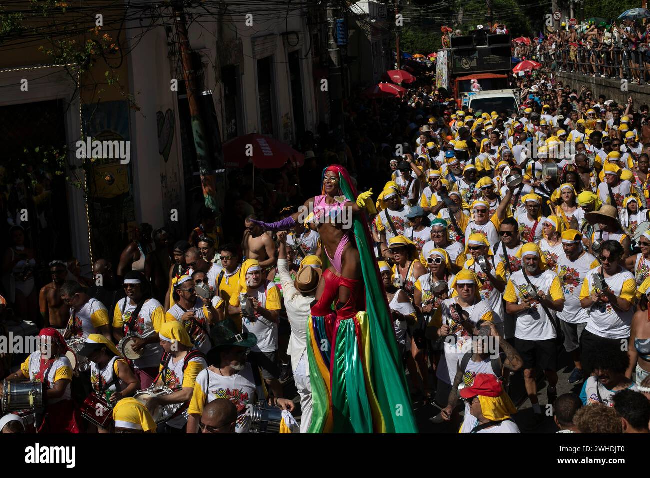 Raquel Poti performs on stilts during the Carmelitas street party on ...