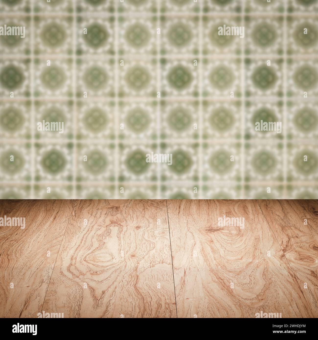 Wood table top and blur vintage ceramic tile pattern wall Stock Photo ...