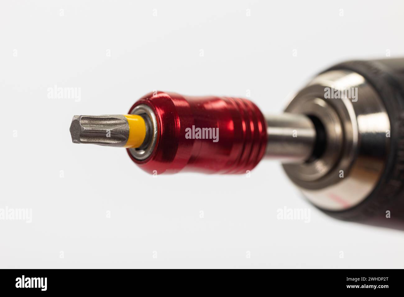 Cordless drill driver with bit holder and inserted Torx bit, detail ...
