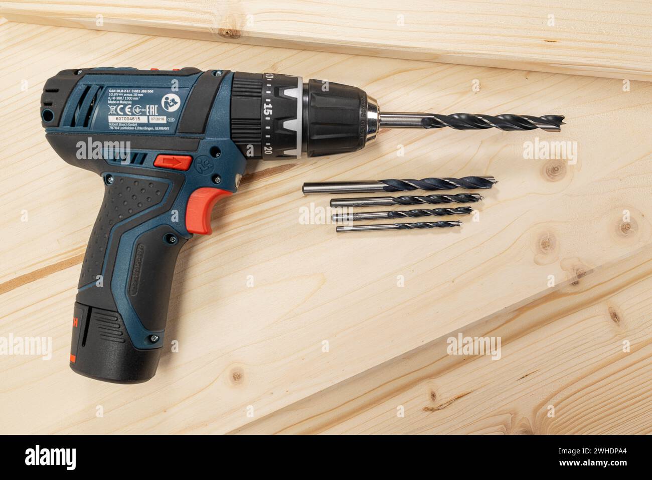 Woodworking, cordless drill driver with inserted wood twist drill 10 mm ...