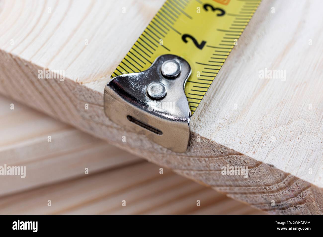 Measure glulam panel, yellow tape measure, stop square, detail ...