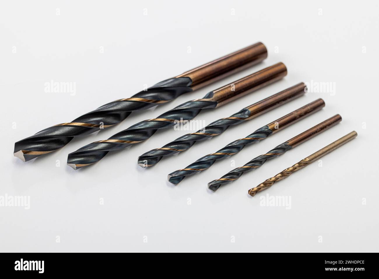 Metal drill bit set 4, 5, 6, 8 and 10 mm, white background Stock Photo ...