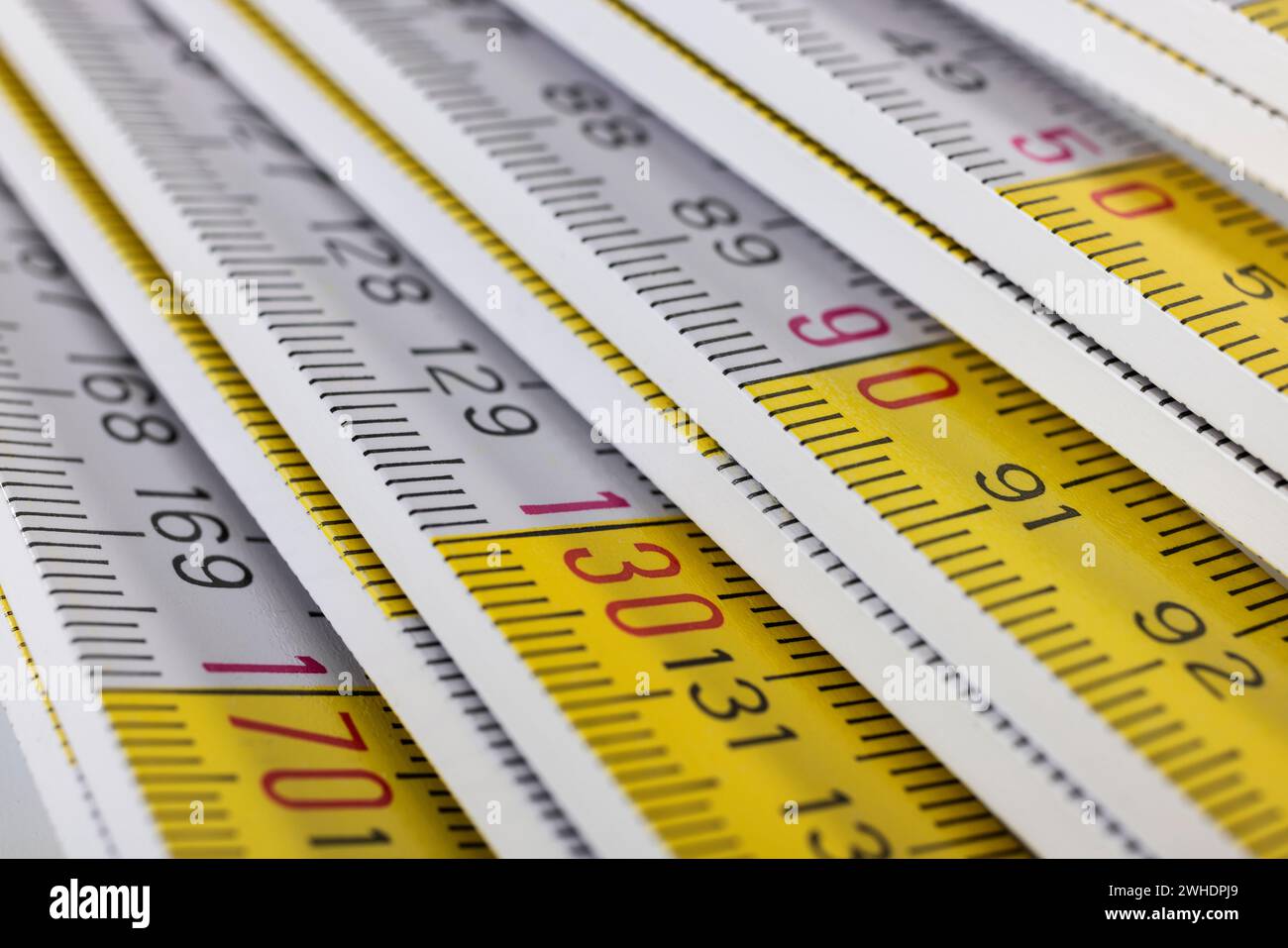 Folding rule, folding ruler, detail, blur Stock Photo - Alamy