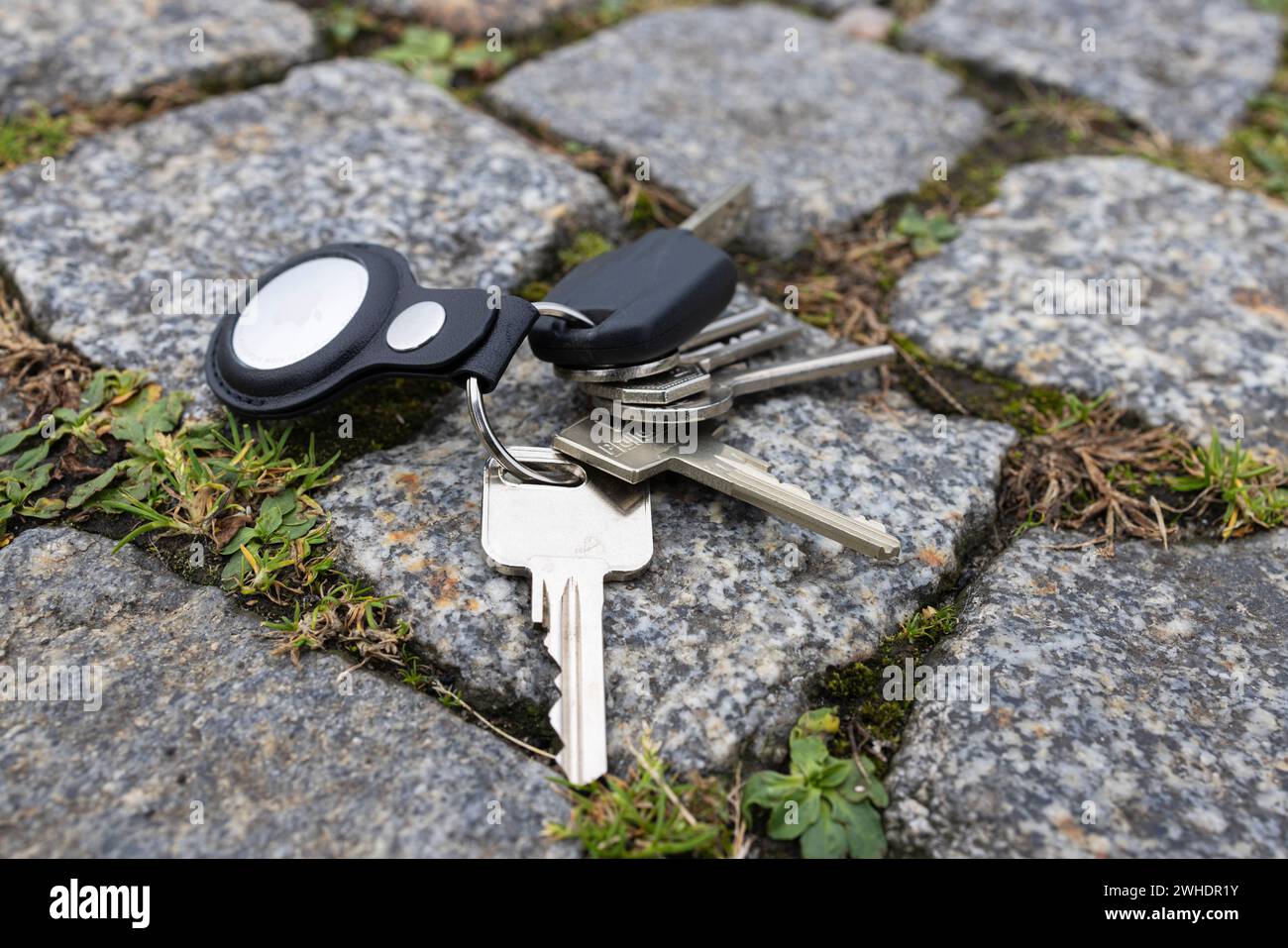 Key ring with Apple AirTag lost on the street, symbol image, lost car ...