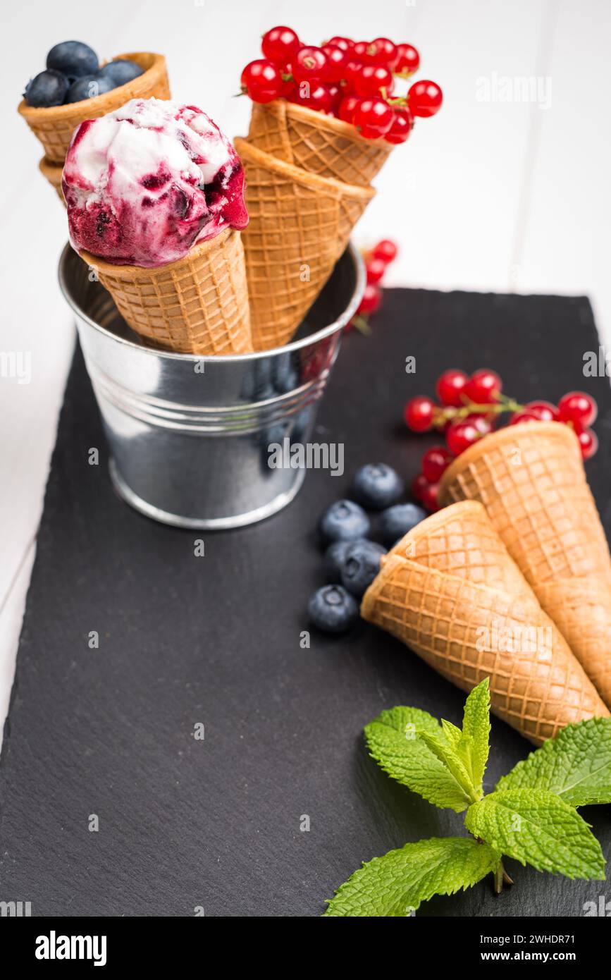 Berry ice cream cone Stock Photo - Alamy
