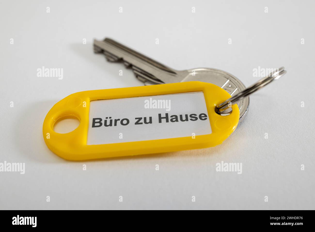 Key with yellow key fob, labeled 'Office at home', dimple key, white ...