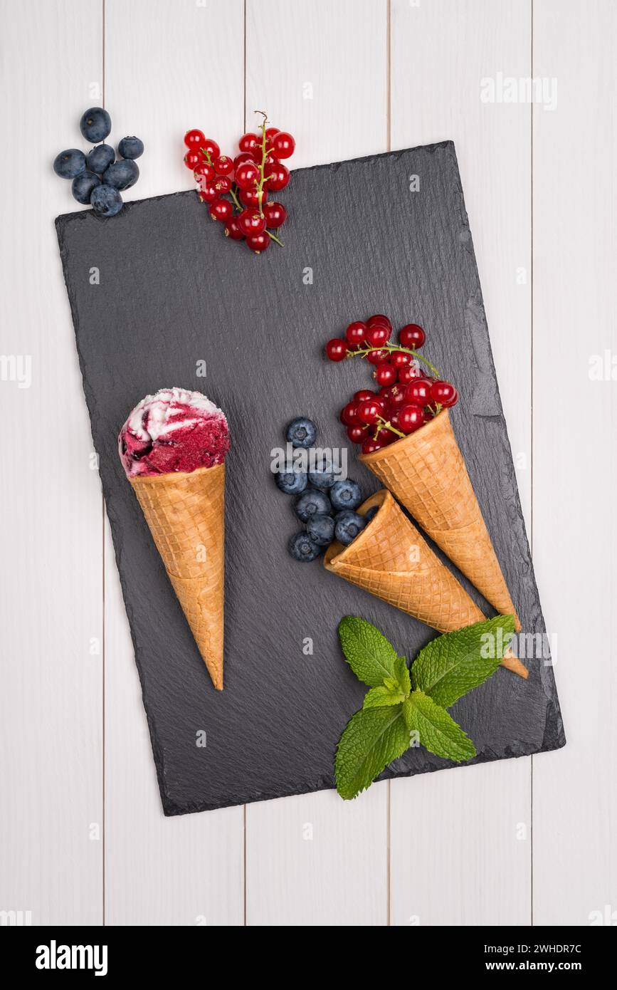 Berry ice cream cone Stock Photo - Alamy