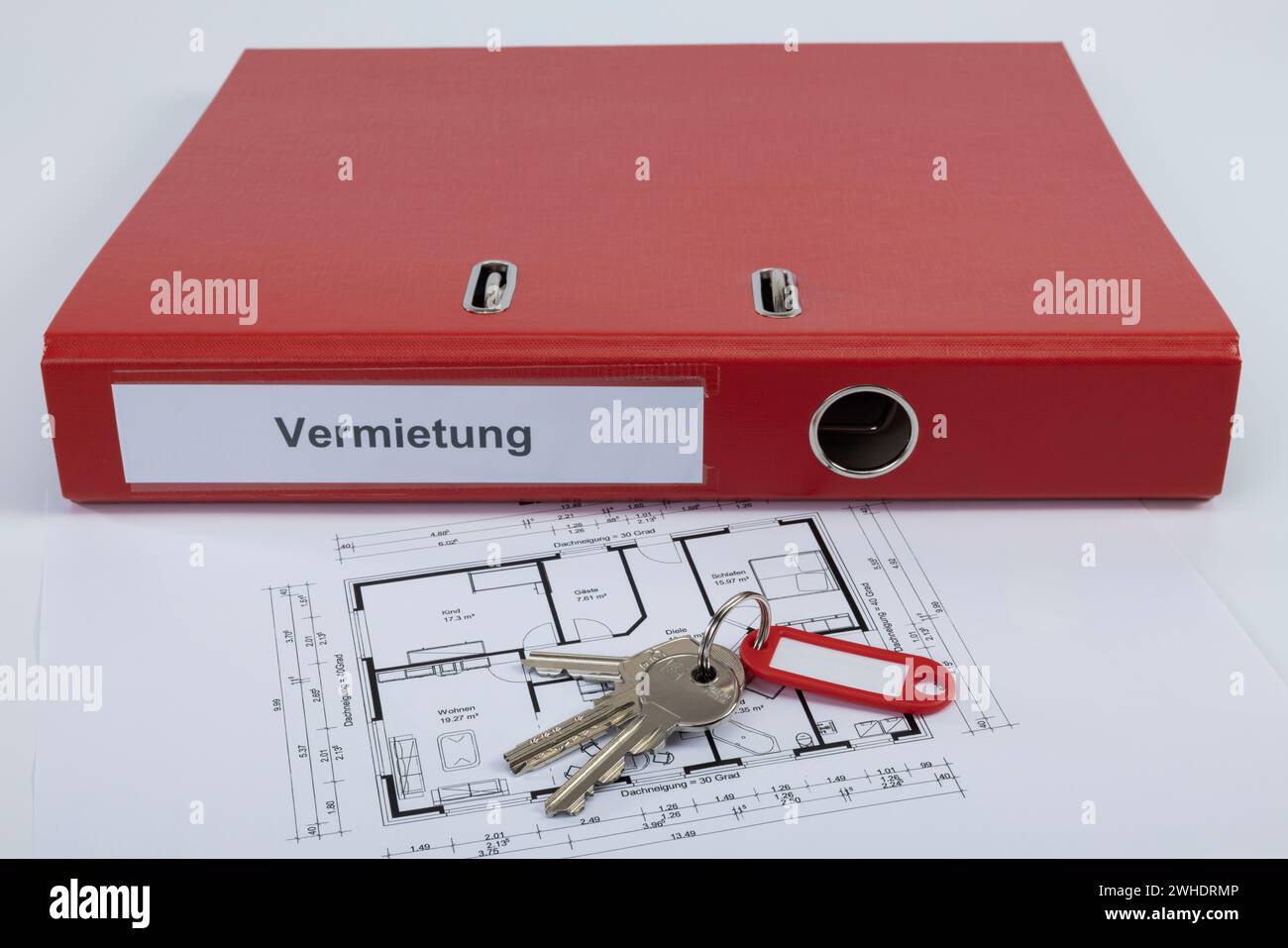 Red file folder with lettering Rental, key ring with red key fob ...