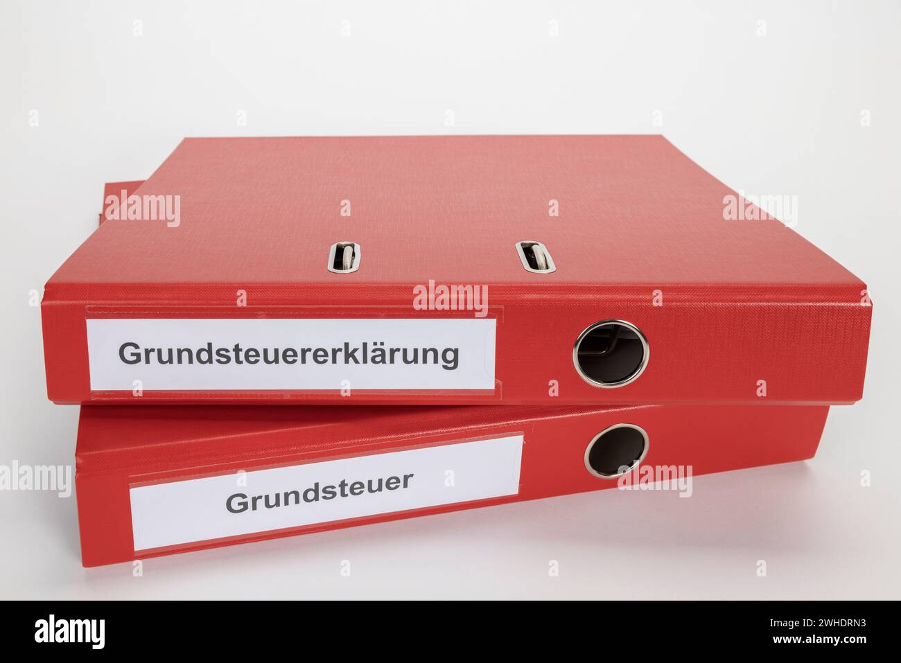 Red file folders labeled property tax return, property taxer, white ...