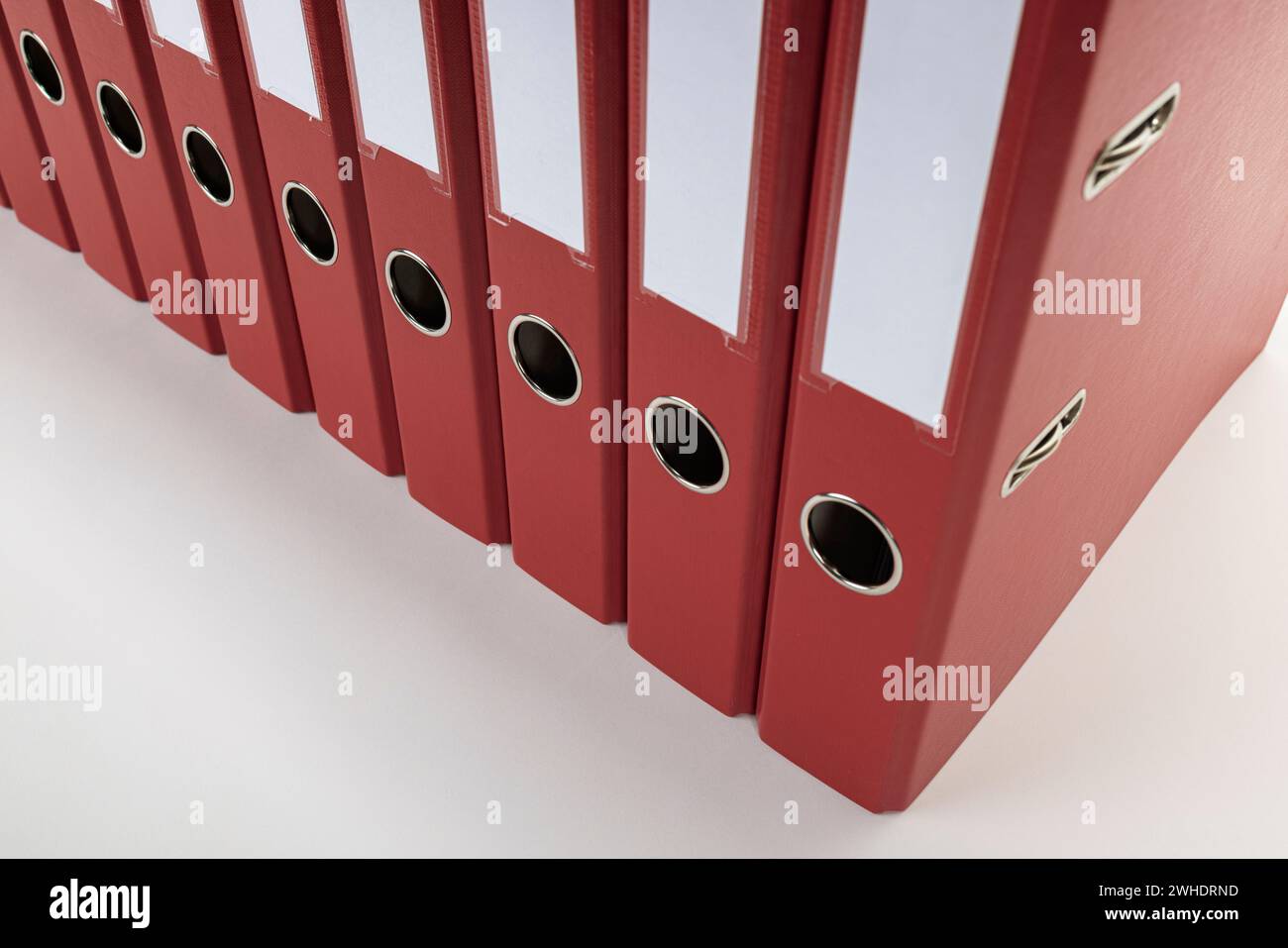 Red file folders without labeling, detail, white background Stock Photo ...