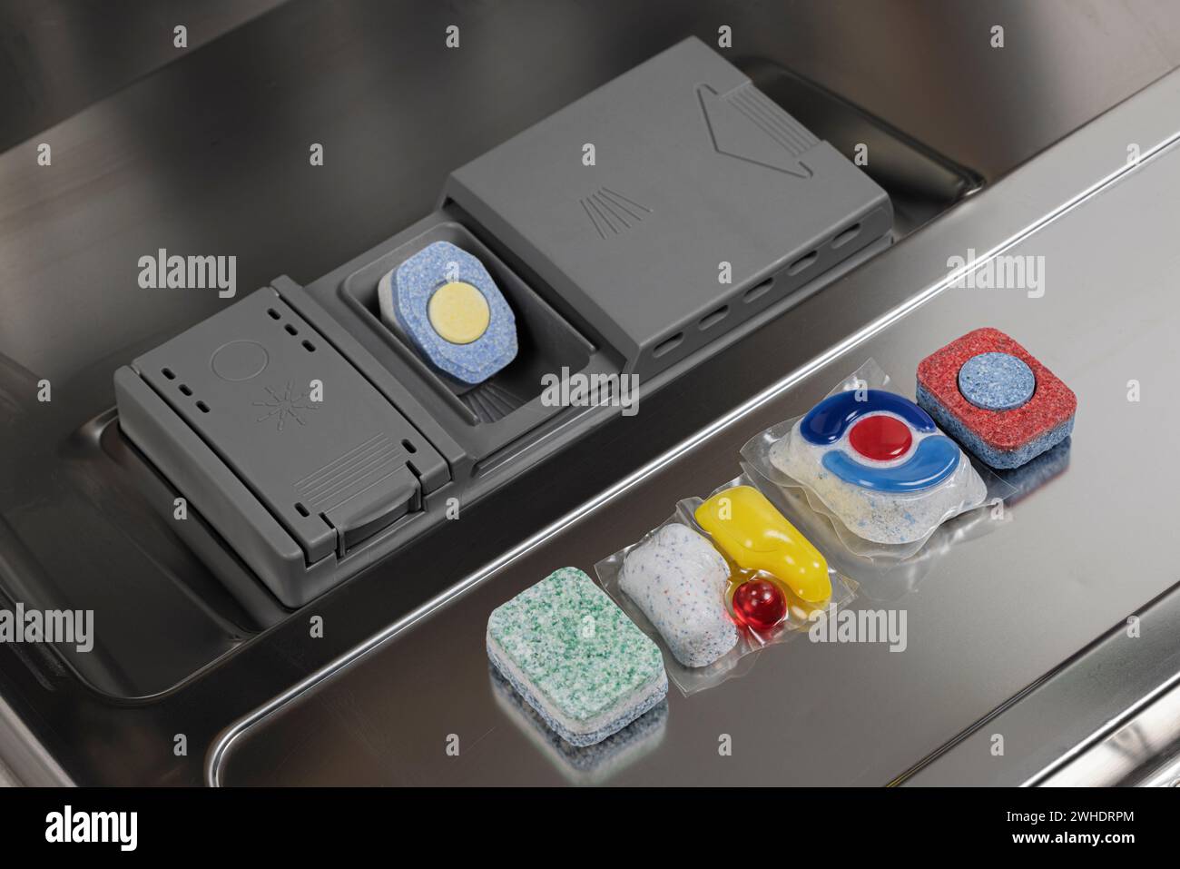 Dosing chamber, five dishwasher detergent tabs, various brands ...