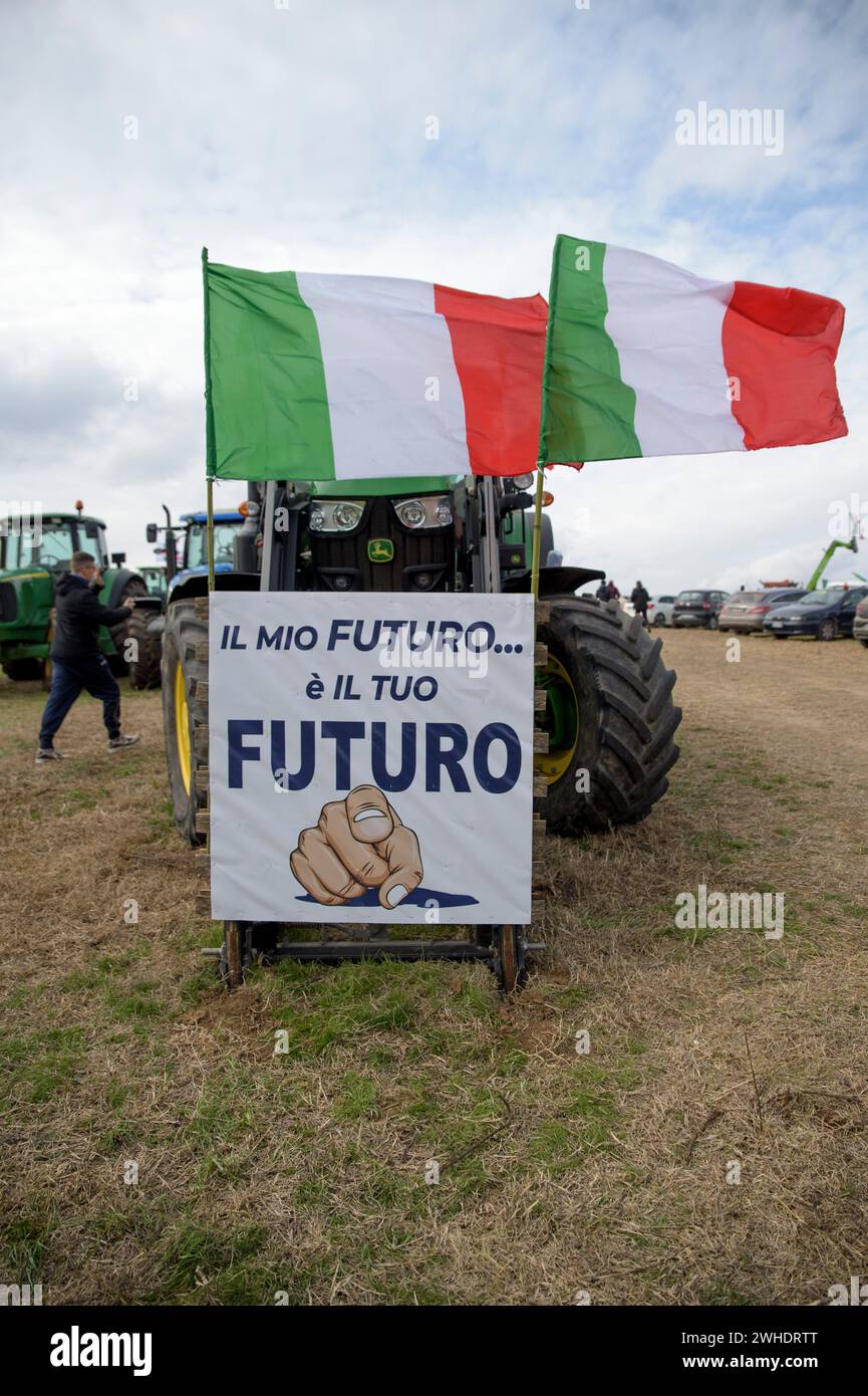 February 9, 2024, Rome, Italy: A tractor holding a sign with the slogan ...