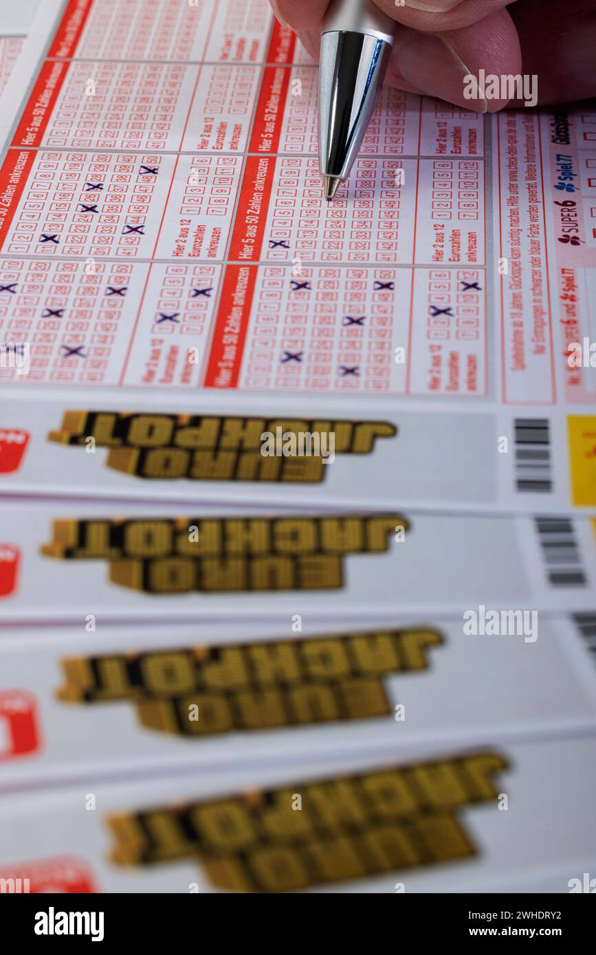 Man fills out ticket, EUROJACKPOT, ballpoint pen, detail Stock Photo ...