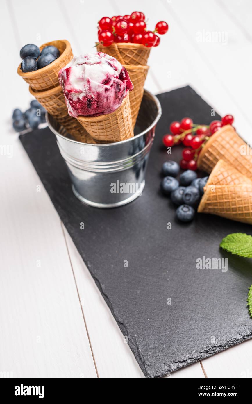 Berry ice cream cone Stock Photo - Alamy