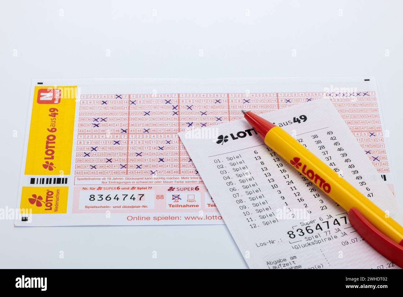 Completed lottery ticket, LOTTO 6aus49, receipt, ballpoint pen, white ...