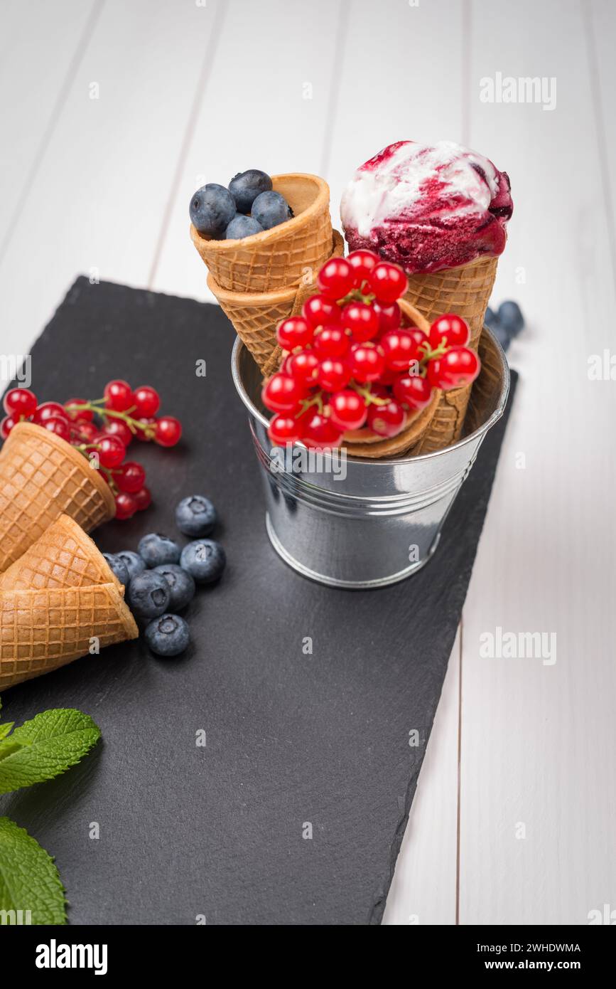 Berry ice cream cone Stock Photo - Alamy