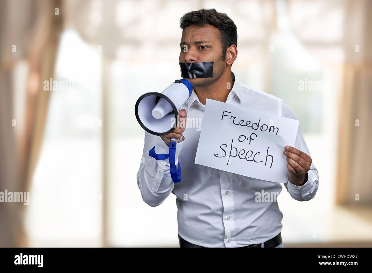 Young censored man loudspeaker hi-res stock photography and images - Alamy