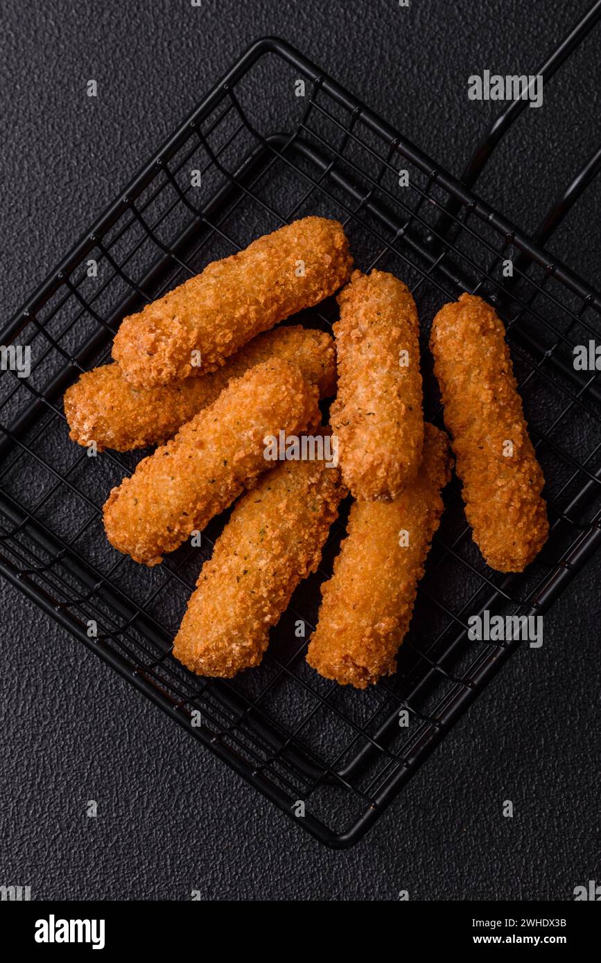 Delicious crispy cheese sticks with mozzarella, salt and spices ...