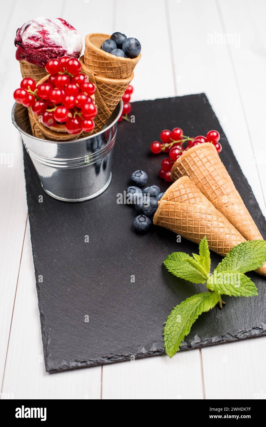 Berry ice cream cone Stock Photo - Alamy
