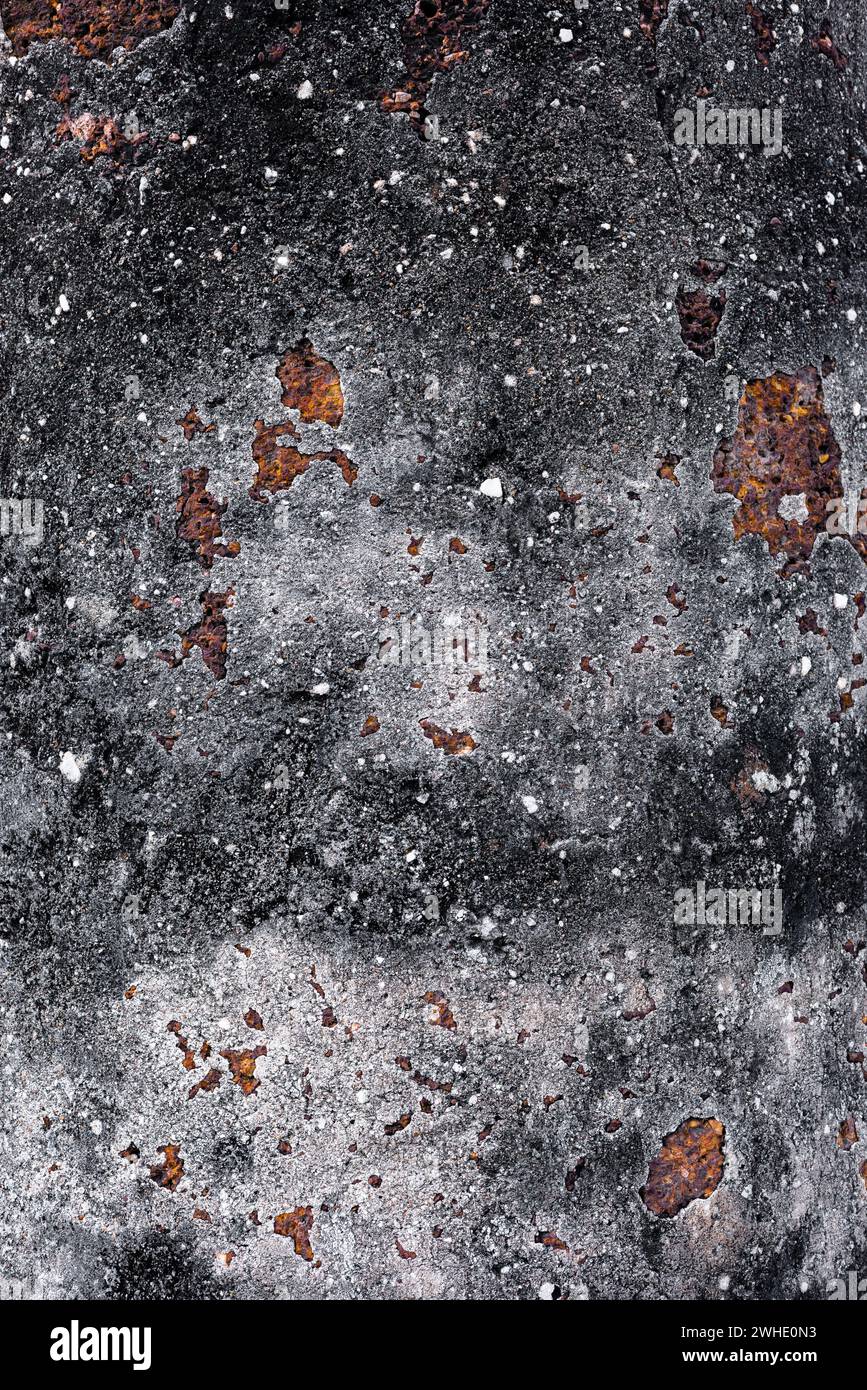 A textured background of degraded rough stone provides a weathered and ...
