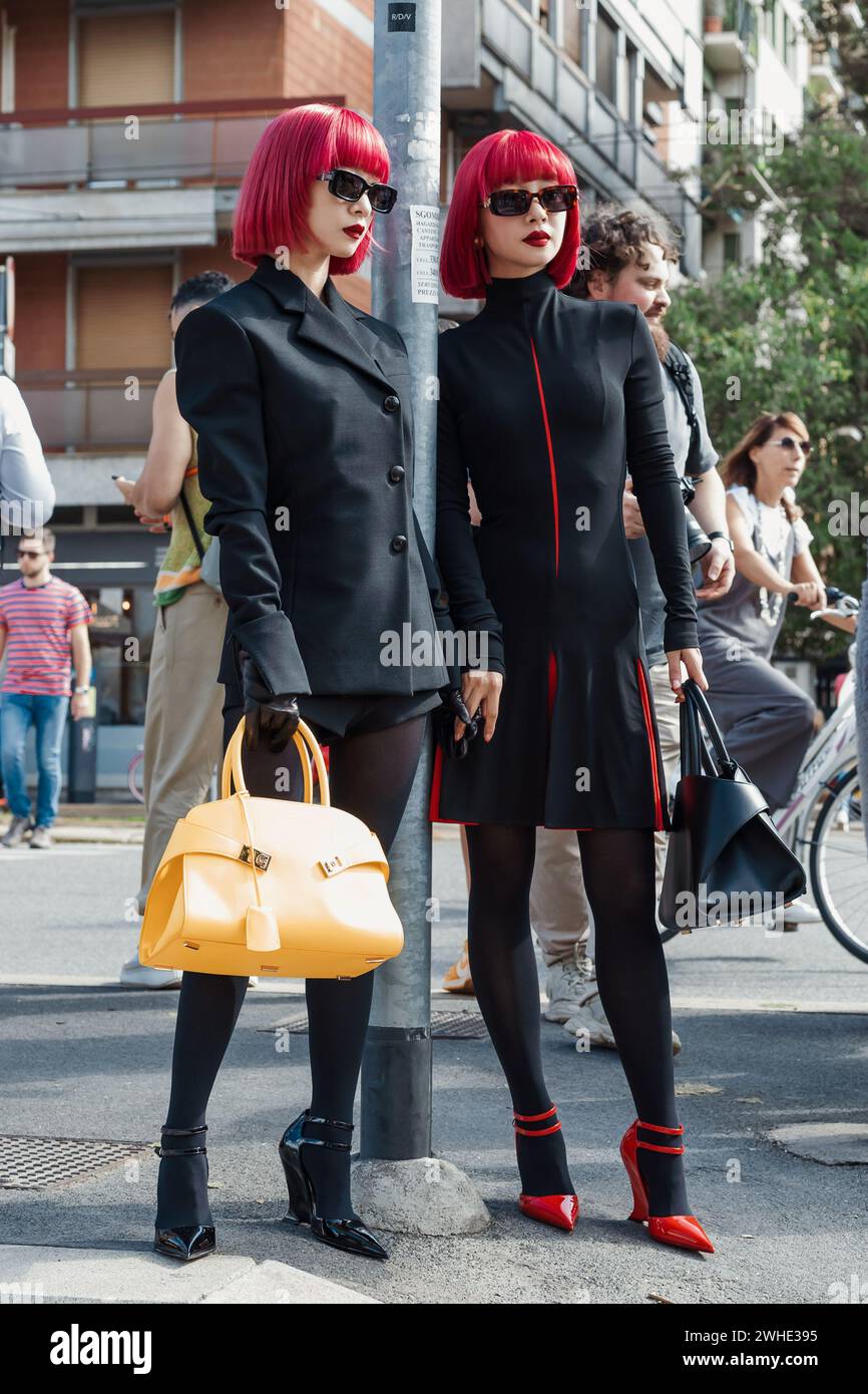 Ami Suzuki and Aya Suzuki wear all Ferragamo, outside Salvatore ...
