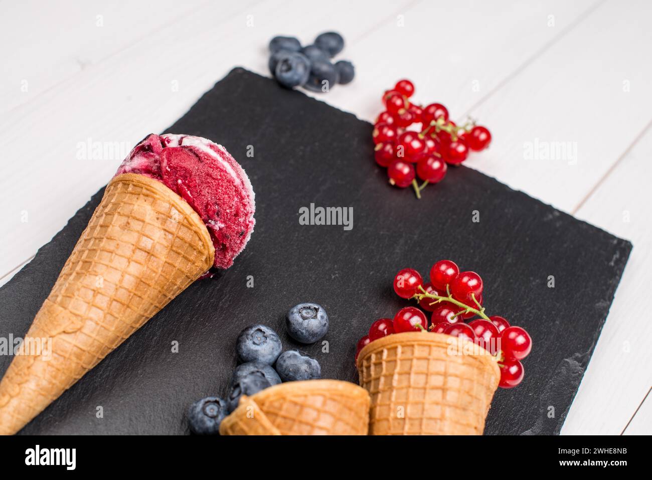 Berry ice cream cone Stock Photo - Alamy