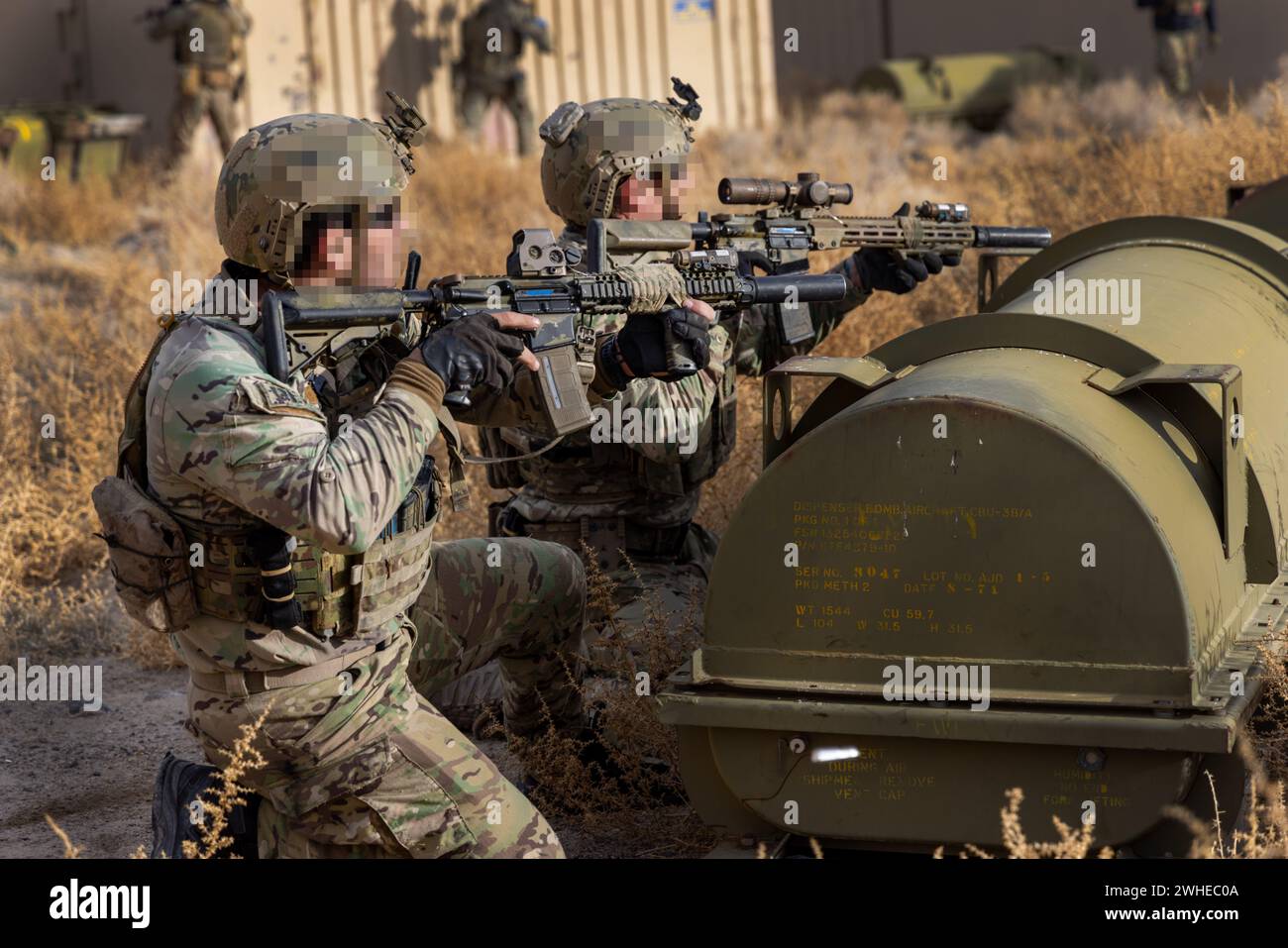 East Coast-based Naval Special Warfare Operators (SEALs) take cover ...