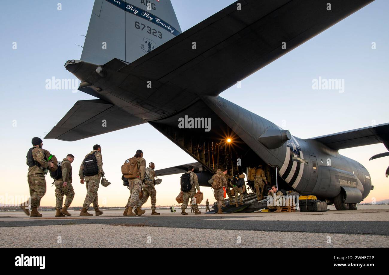 U.S. Air Force Airmen, assigned to the 4th Fighter Wing, board a C-130H ...