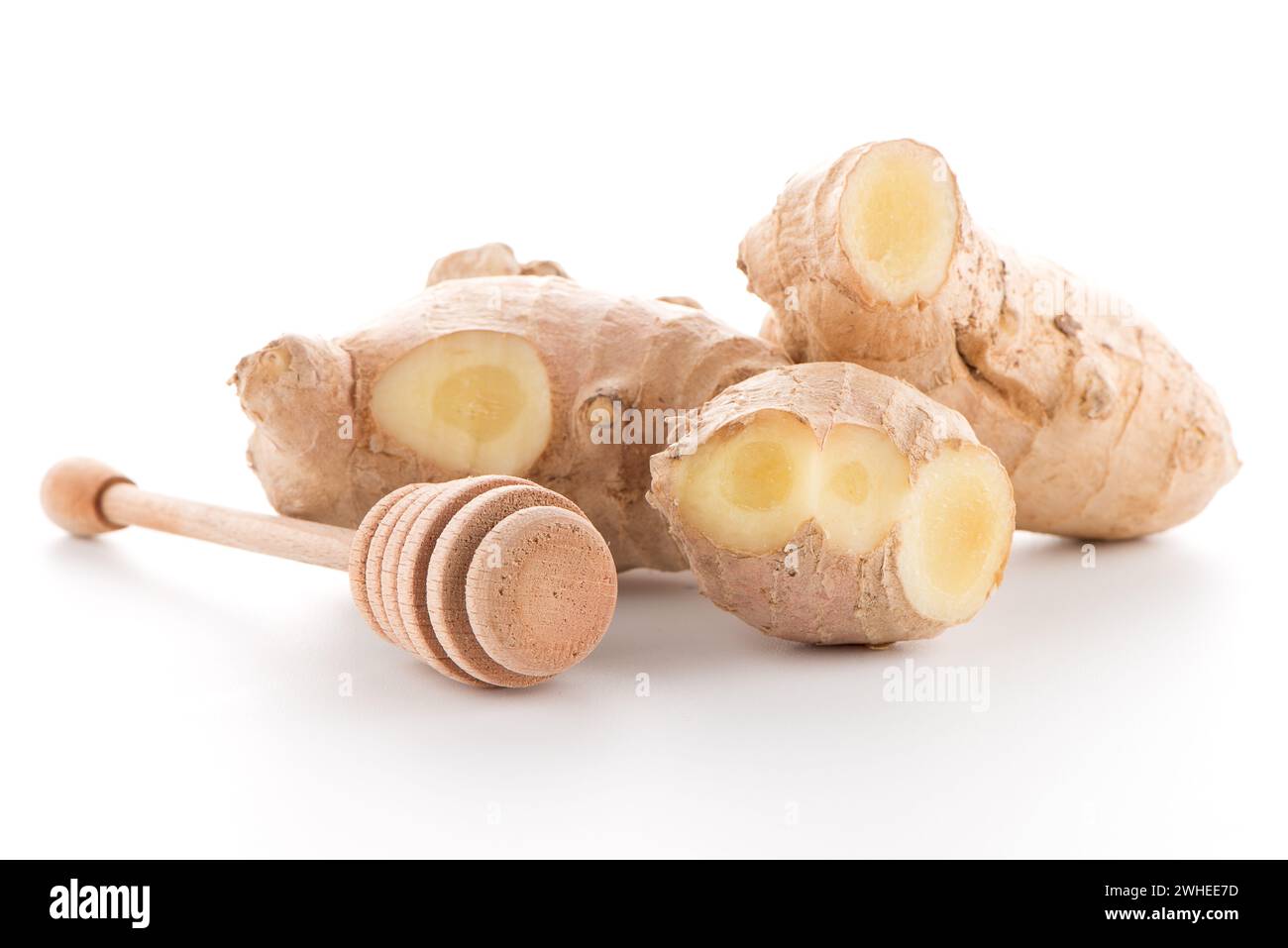 Ginger root and drizzler Stock Photo - Alamy