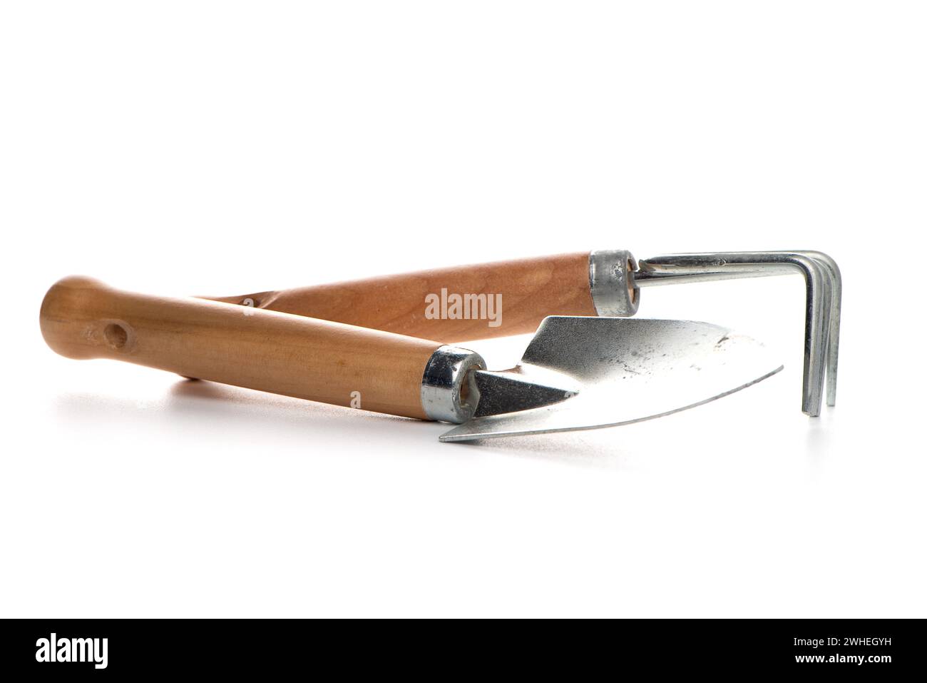 Small gardening shovel and fork Stock Photo - Alamy