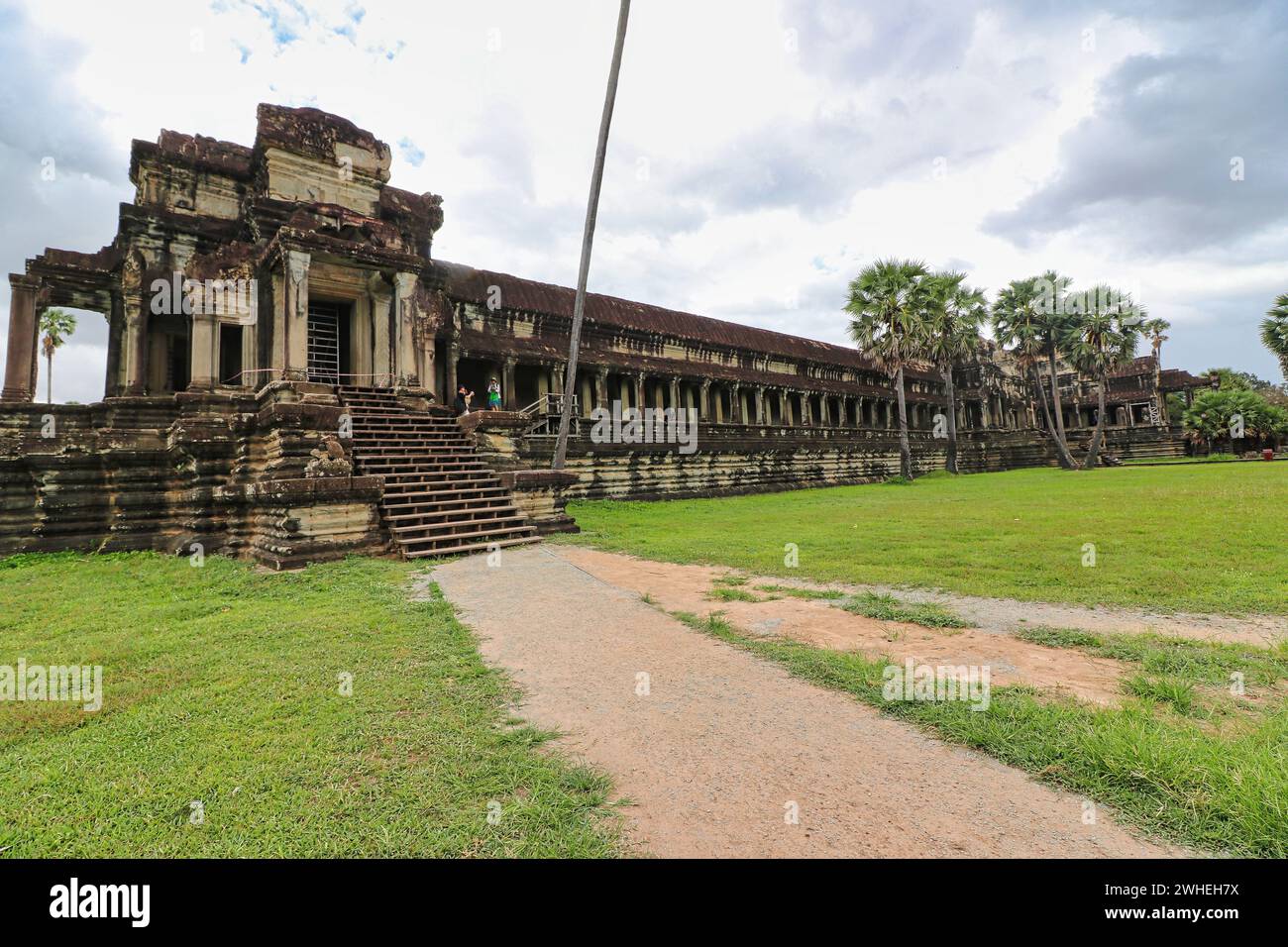 Angkor Wat temple outer quadrangle on a rain soaked day. The temple is ...