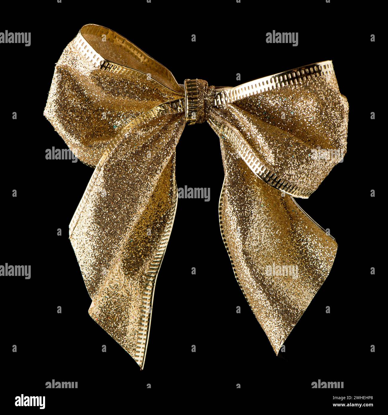 Beautiful gold ribbon bow hi-res stock photography and images - Alamy