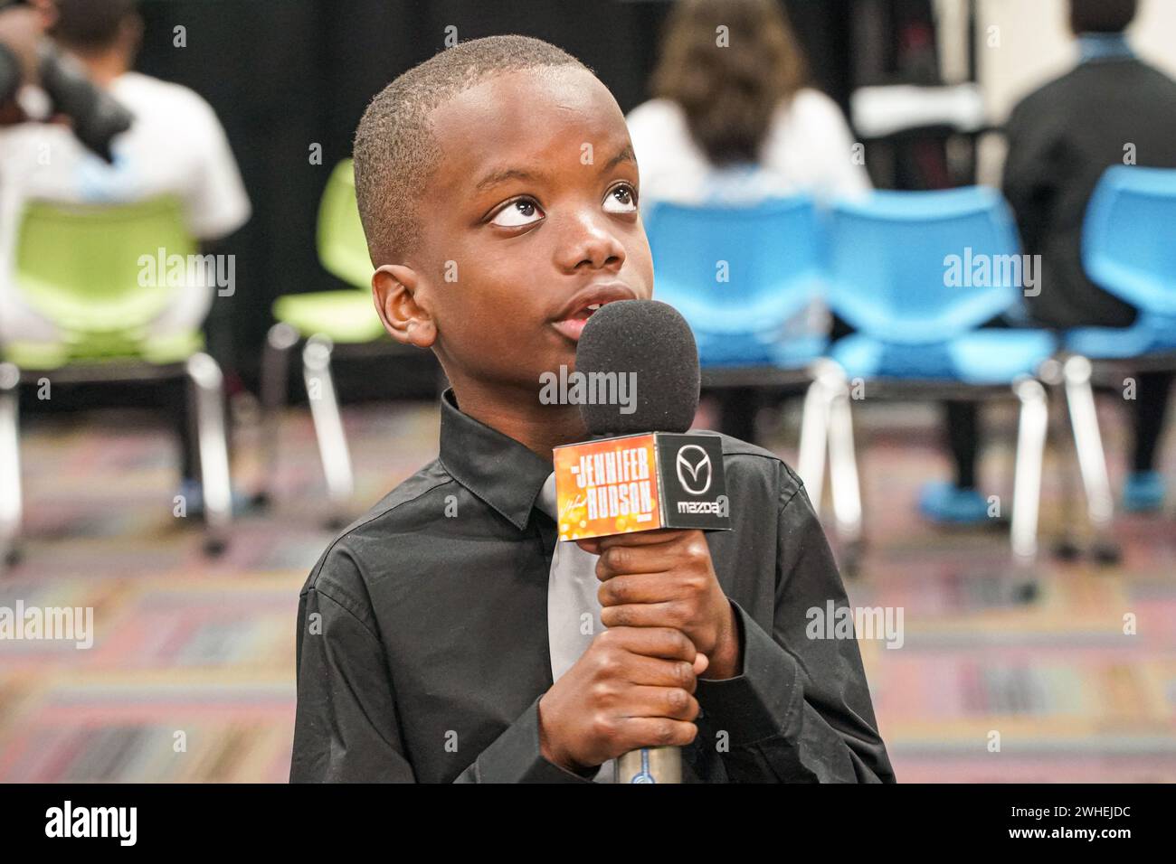 Henderson, Nevada, USA, February 9, 2024, Kid Reporter Jeremiah doing ...