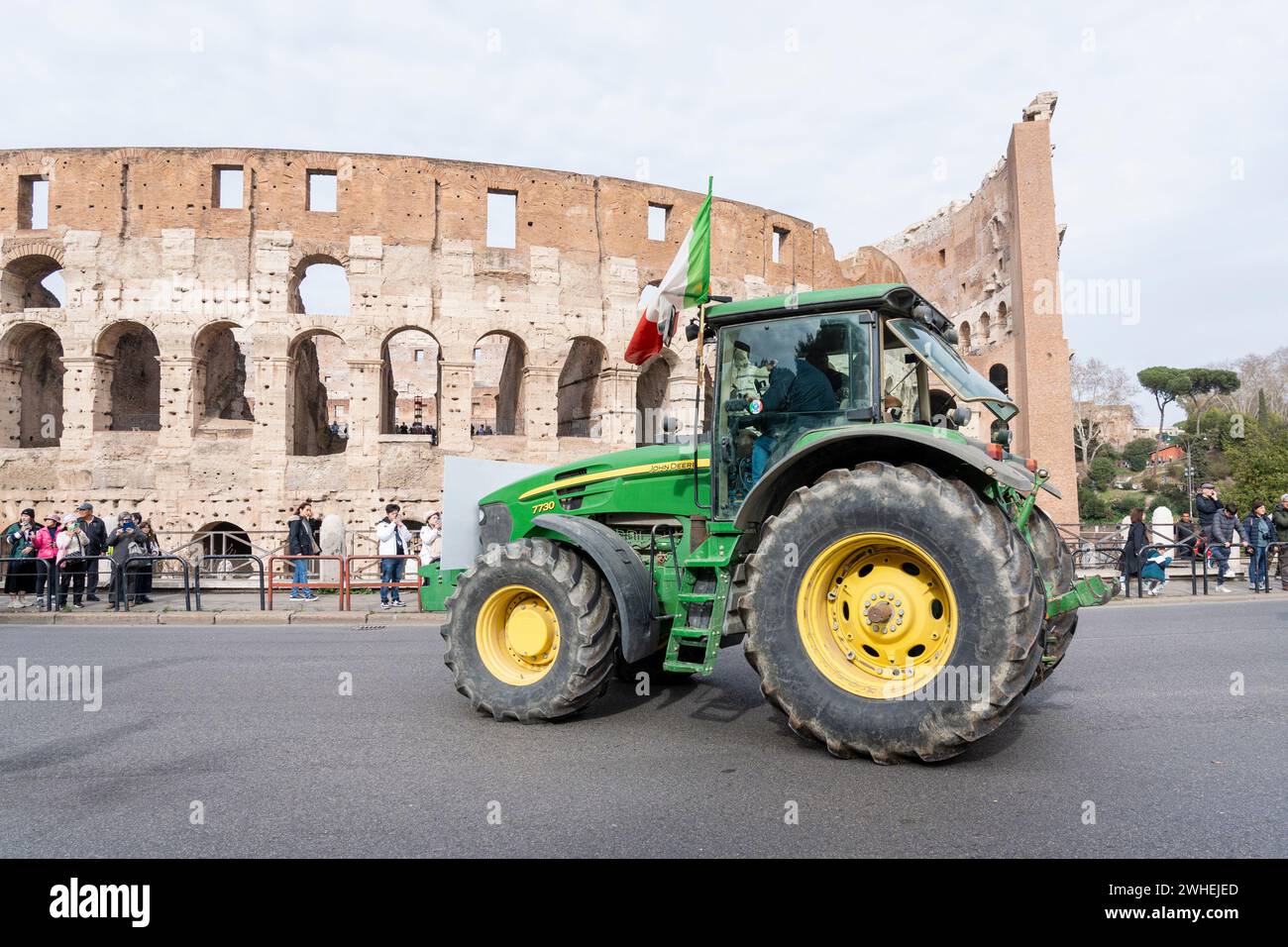 Rome, Italy. 09th Feb, 2024. Italian farmers drive their tractor on the ...
