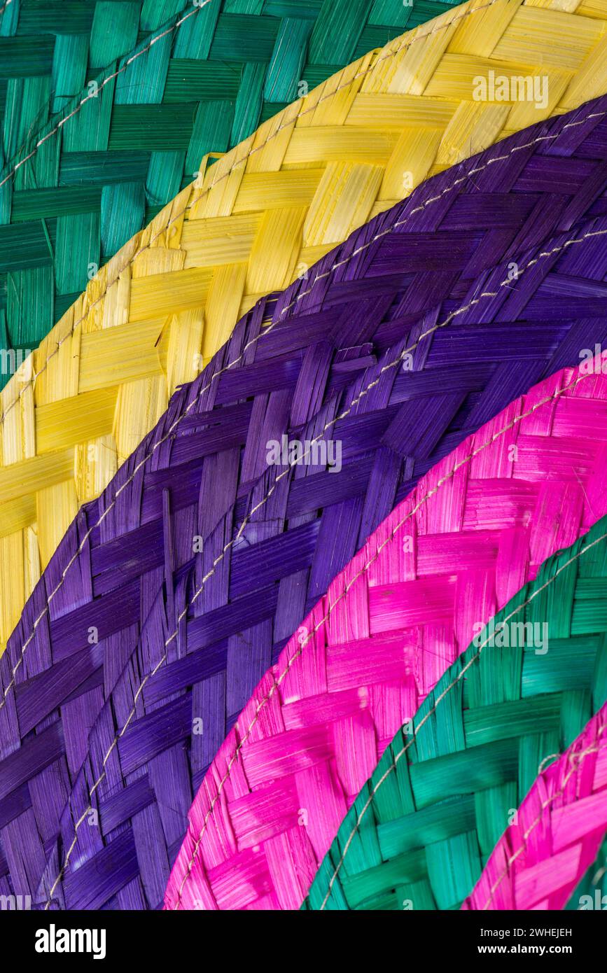 Colorful background of woven straw Stock Photo - Alamy