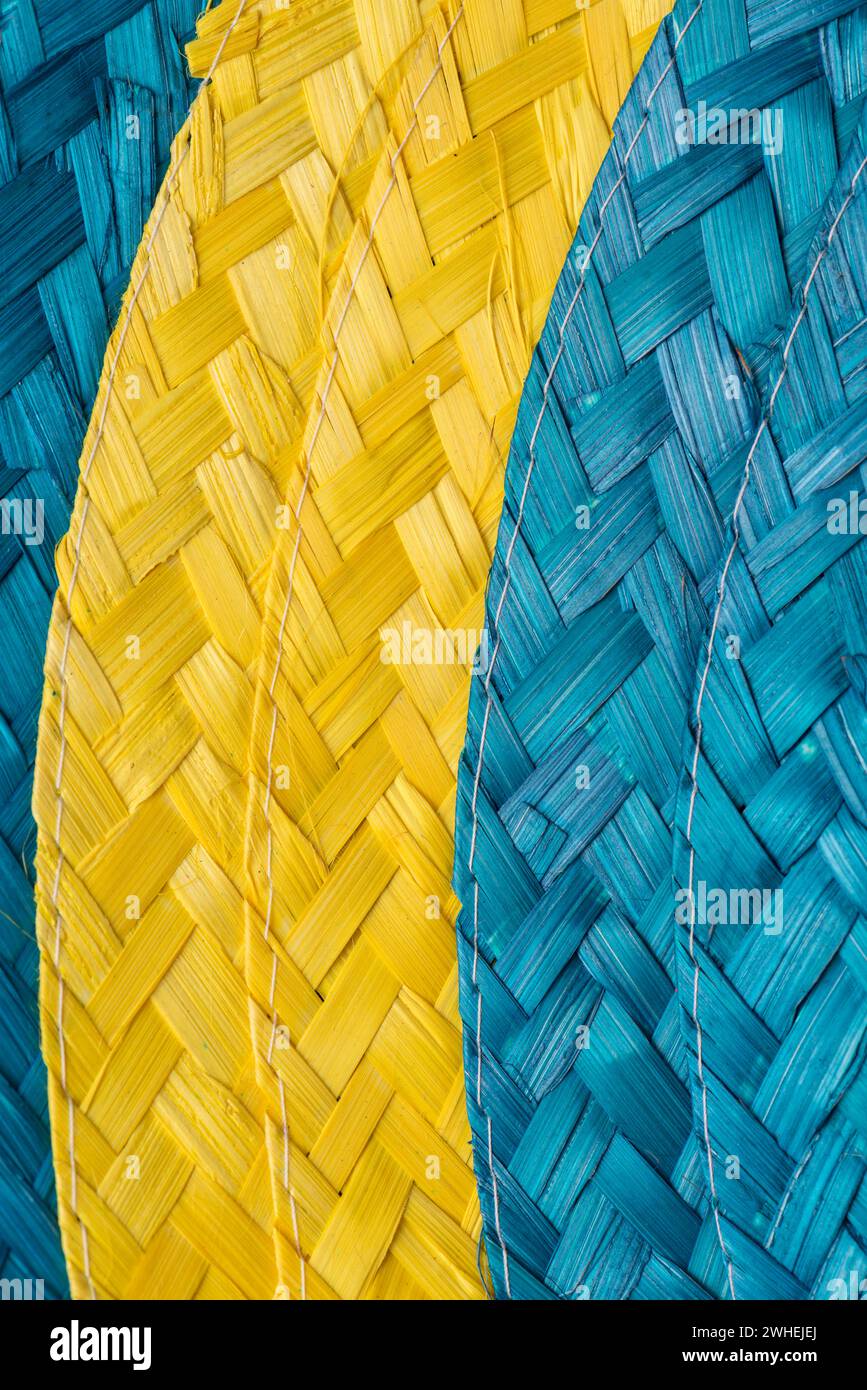Colorful background of woven straw Stock Photo - Alamy