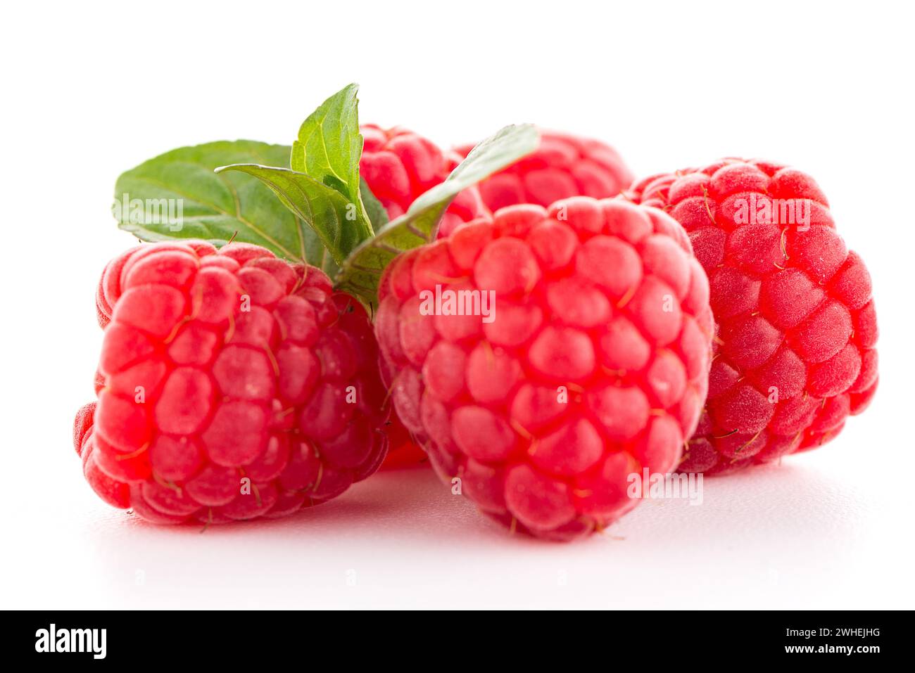 Fresh raw raspberries green hi-res stock photography and images - Alamy