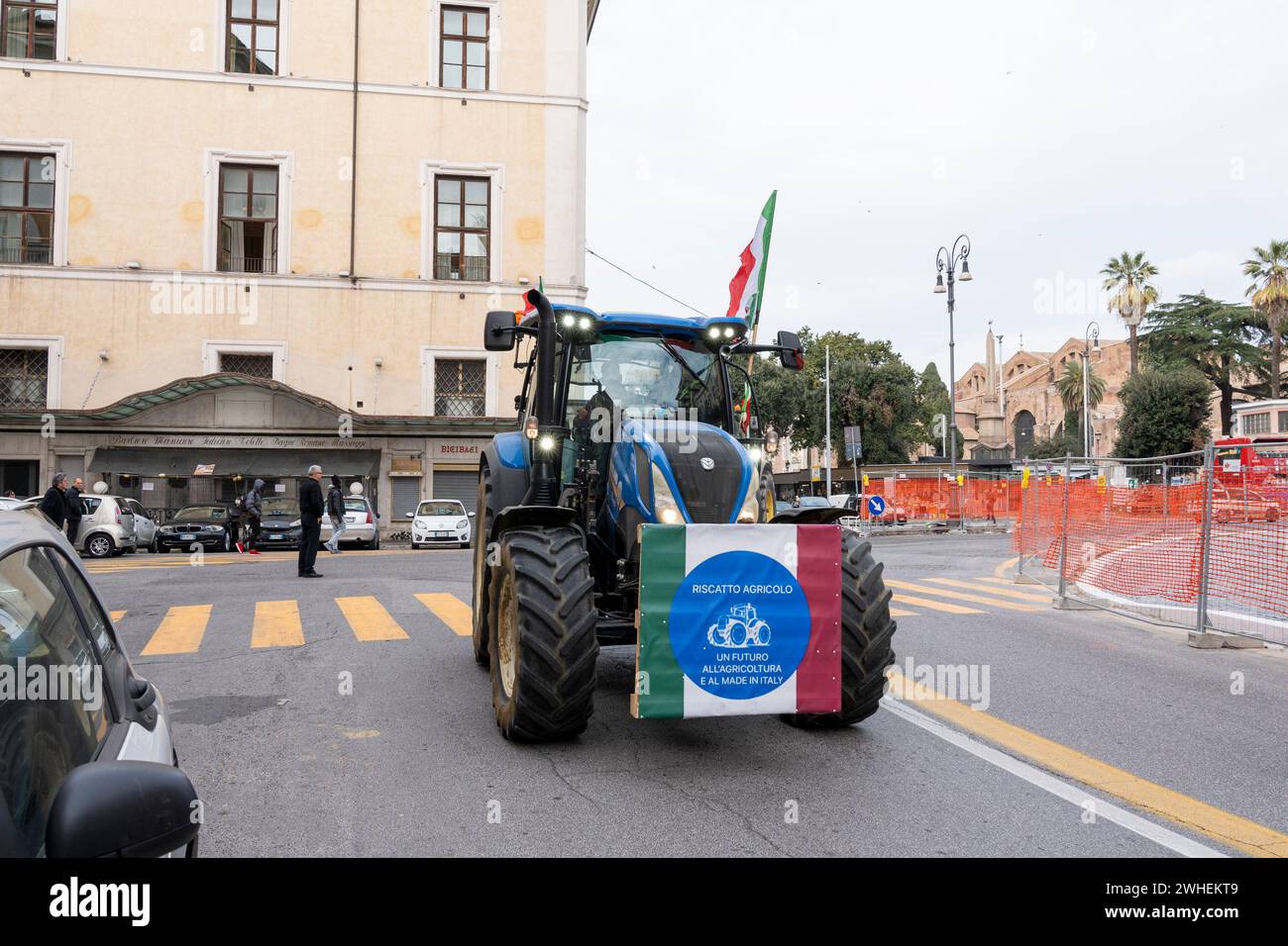 Rome, Italy. 09th Feb, 2024. Italian farmers drive their tractor on the ...