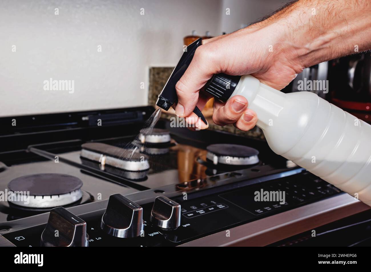 Spraying stove hi-res stock photography and images - Alamy