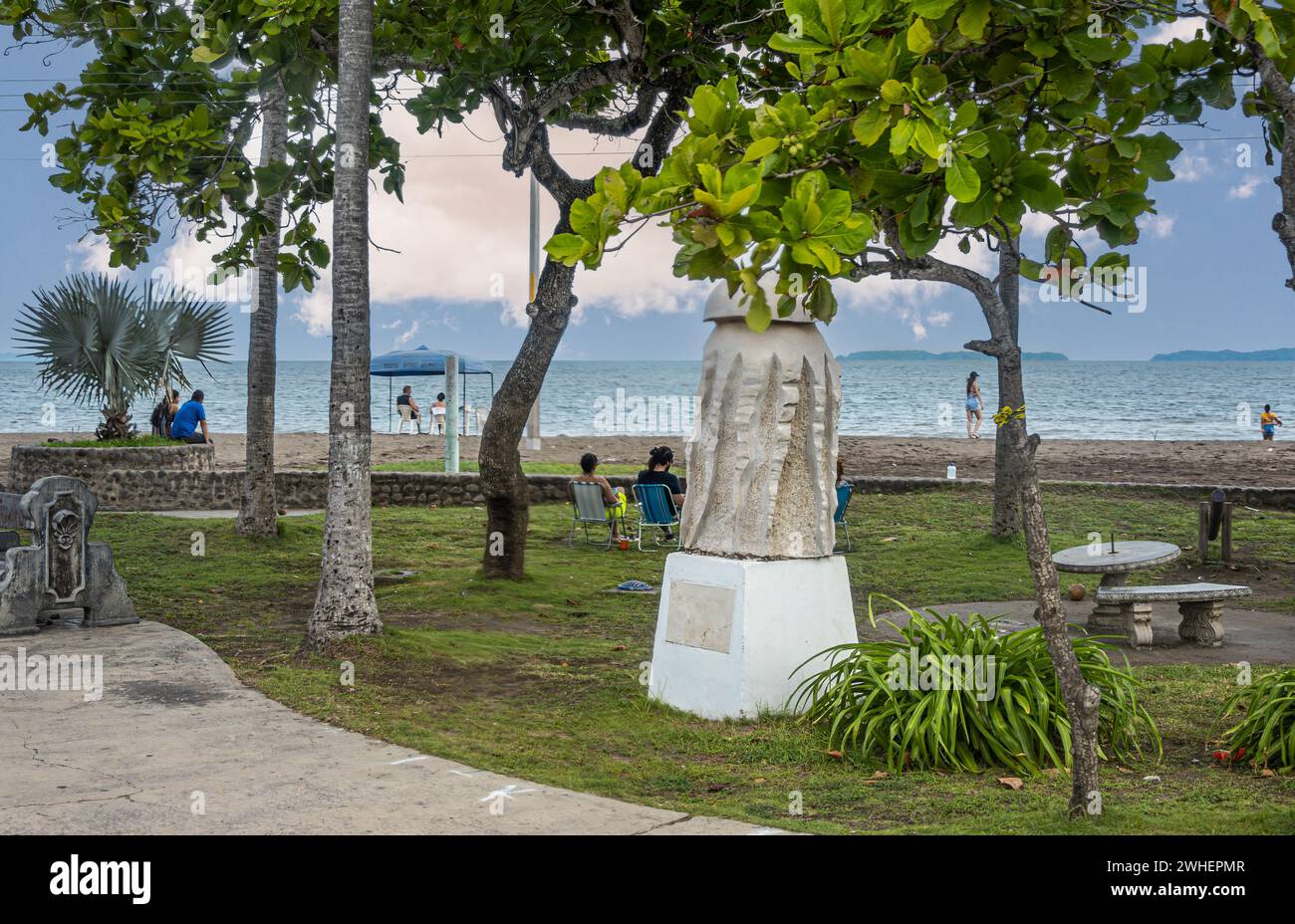 Costa Rica, Puntarenas - July 22, 20.23: White stone large squid statue ...