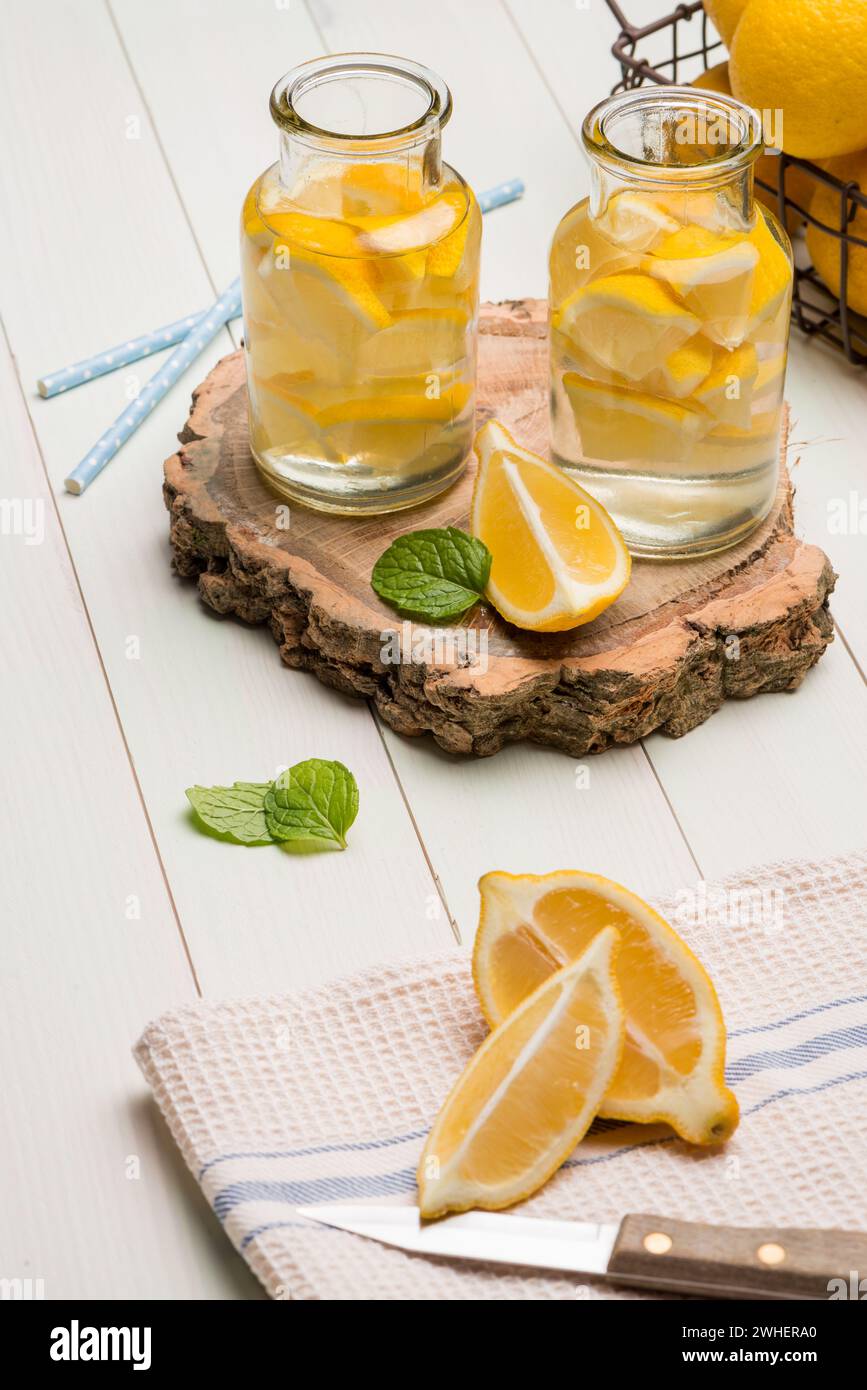 Lemon and lime slices in jars Stock Photo - Alamy